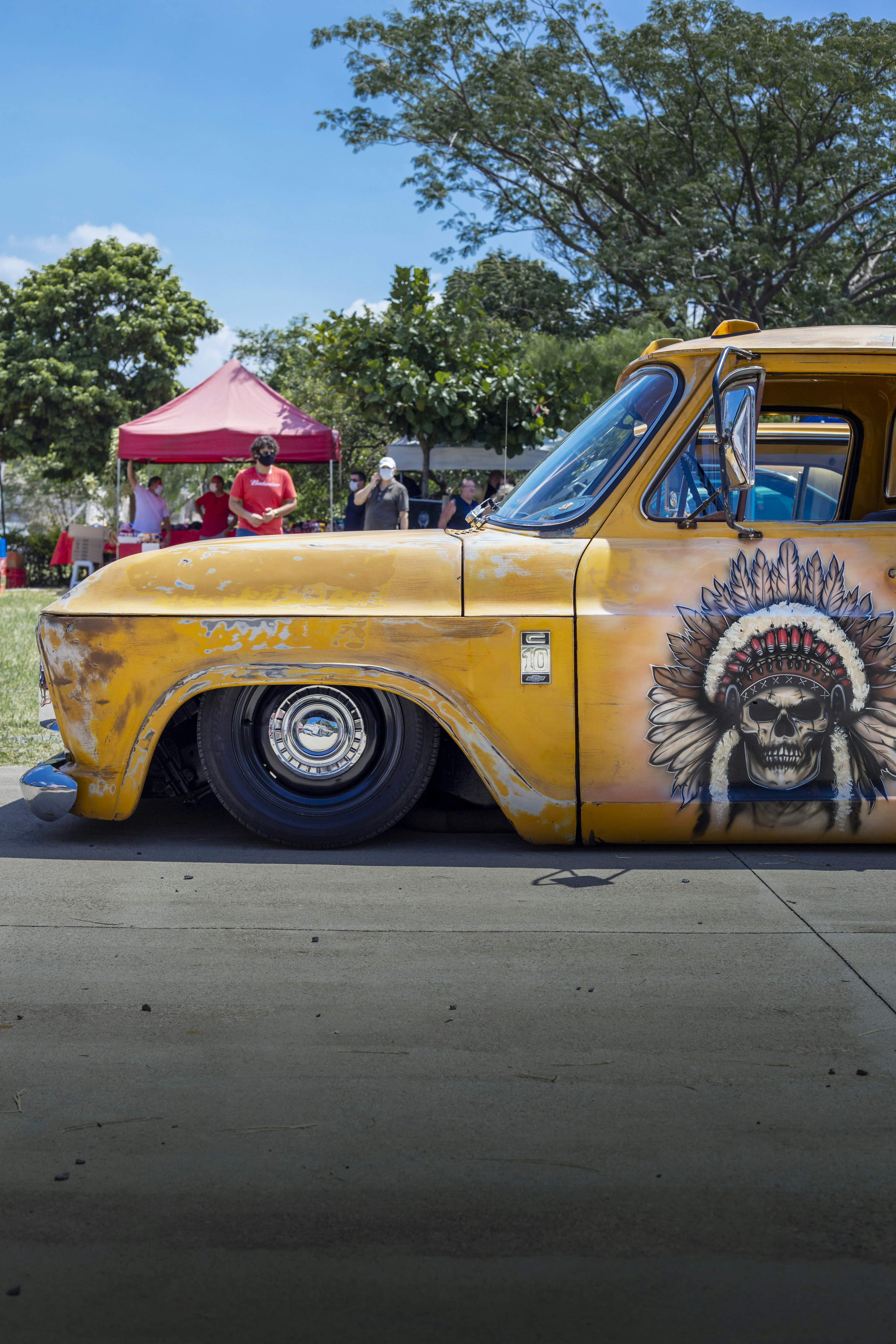 Golden Road Warrior: A Painted Classic in a Summer Street Fair