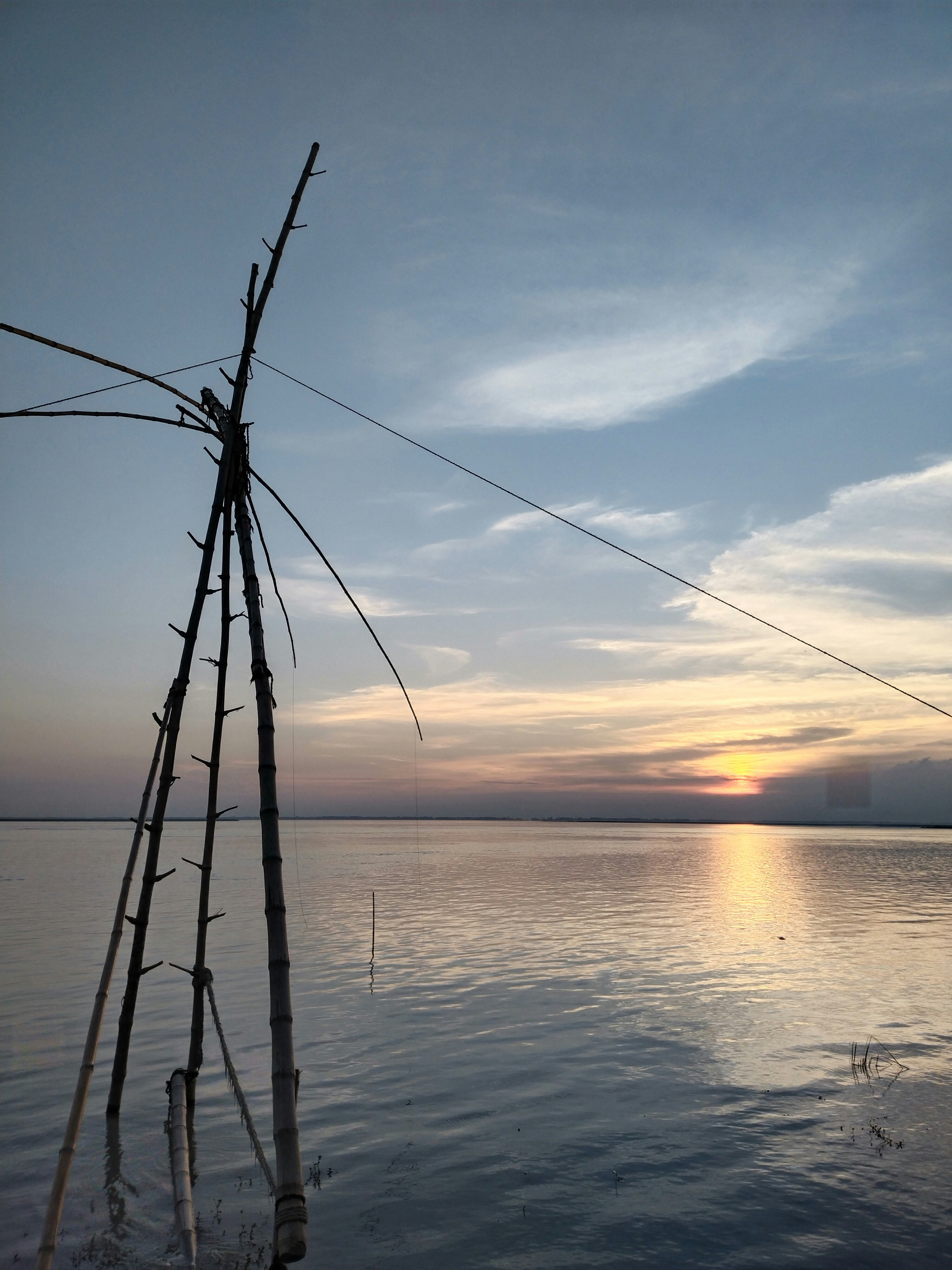 a boat sitting on top of a body of water