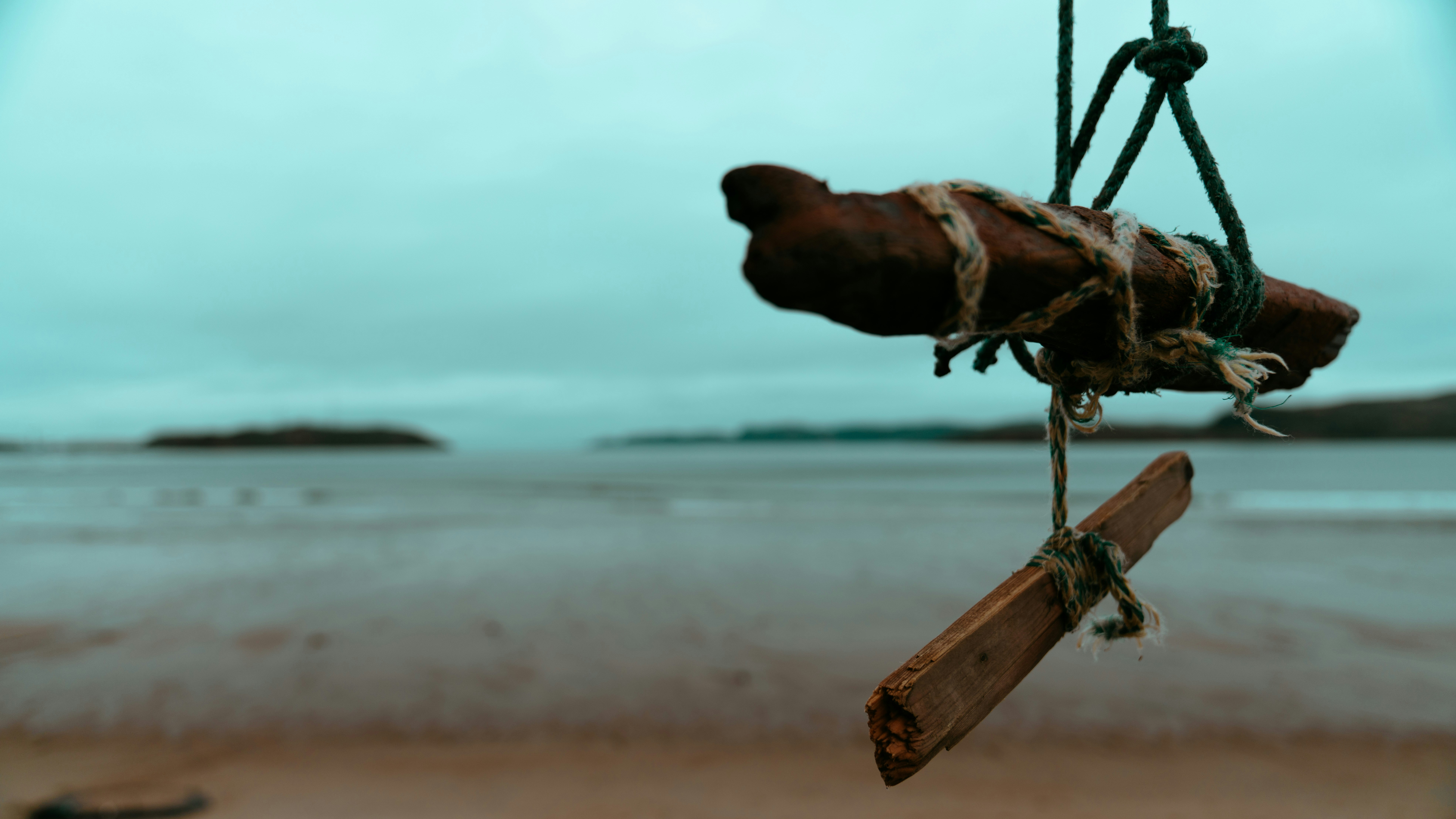 Rope and Driftwood Crunch on a Quiet Tidescape