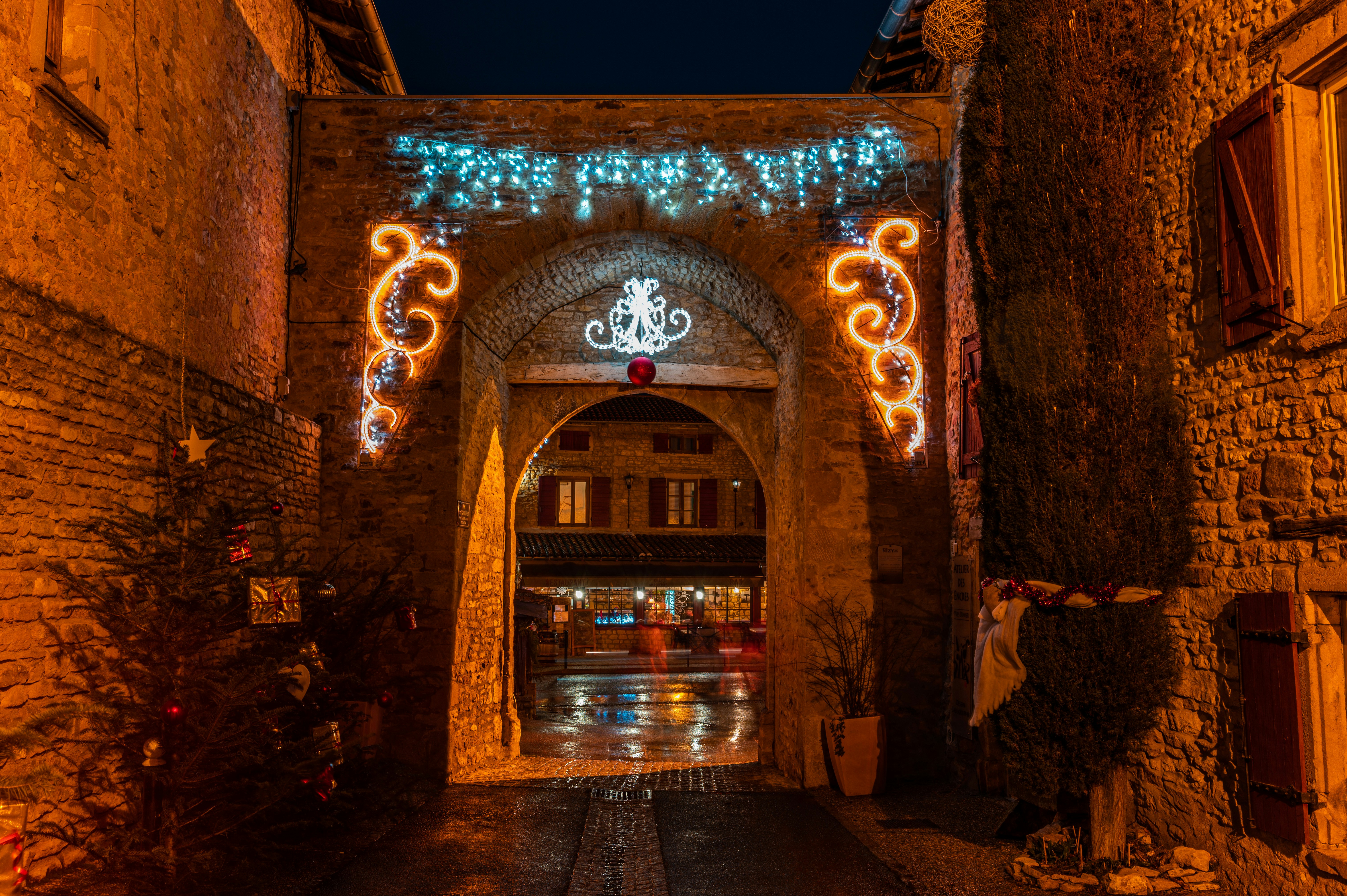 Through the Gate of Lights: A Winter Evening in a Quiet Town