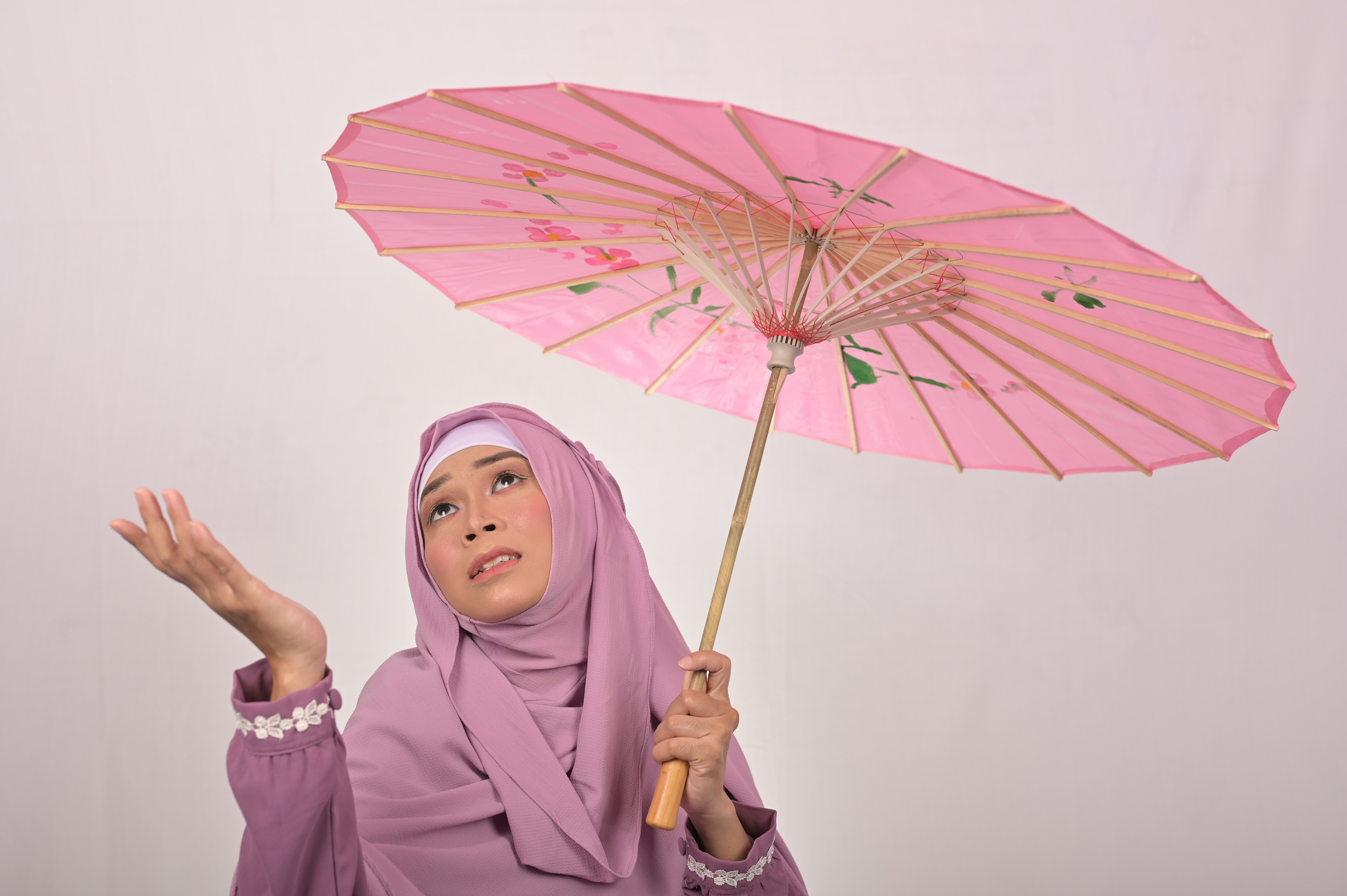 Lilac Veil Under a Pink Floral Parasol: Studio Portrait of Poise
