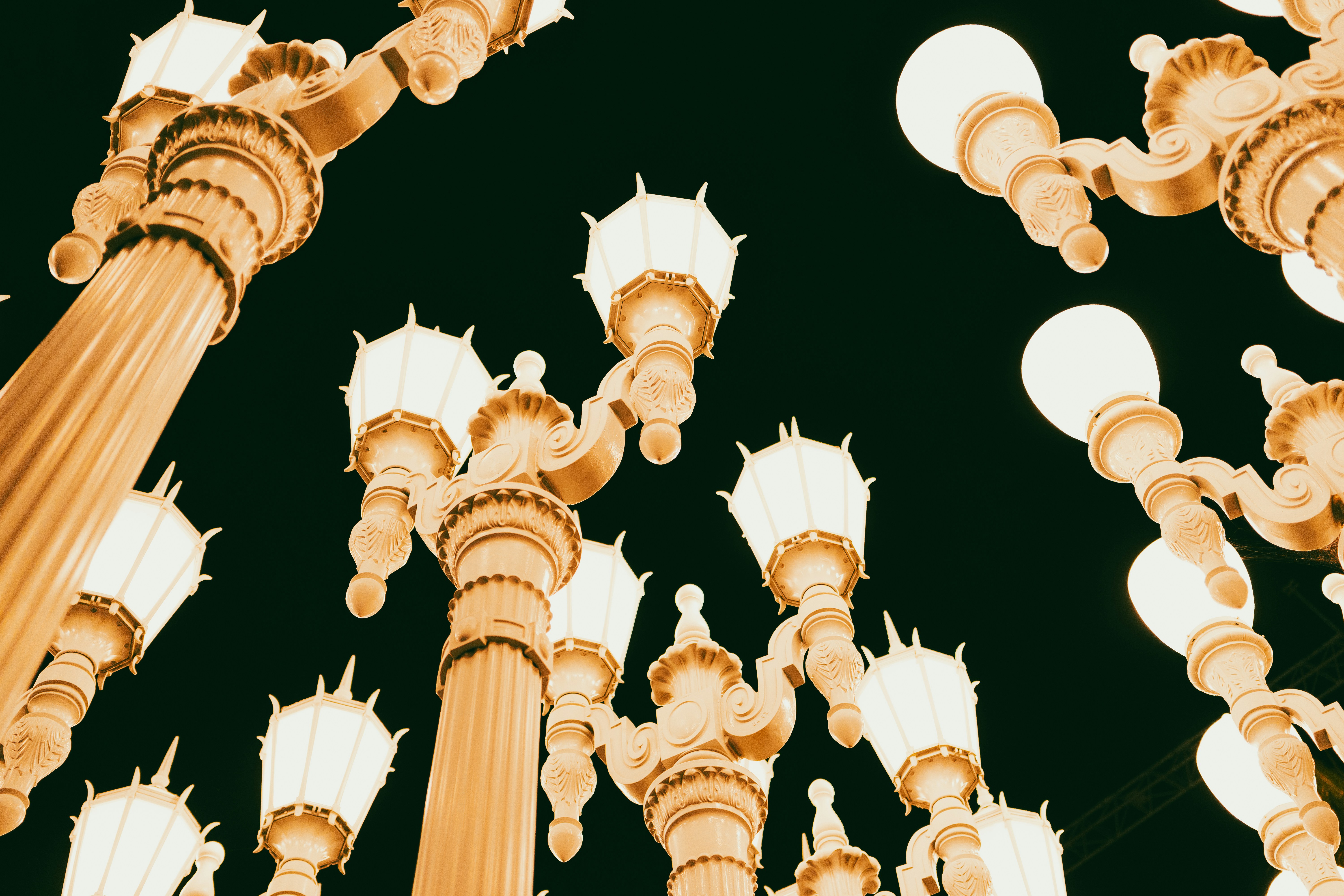 A group of lights that are next to each other photo – Free Ca Image on ...