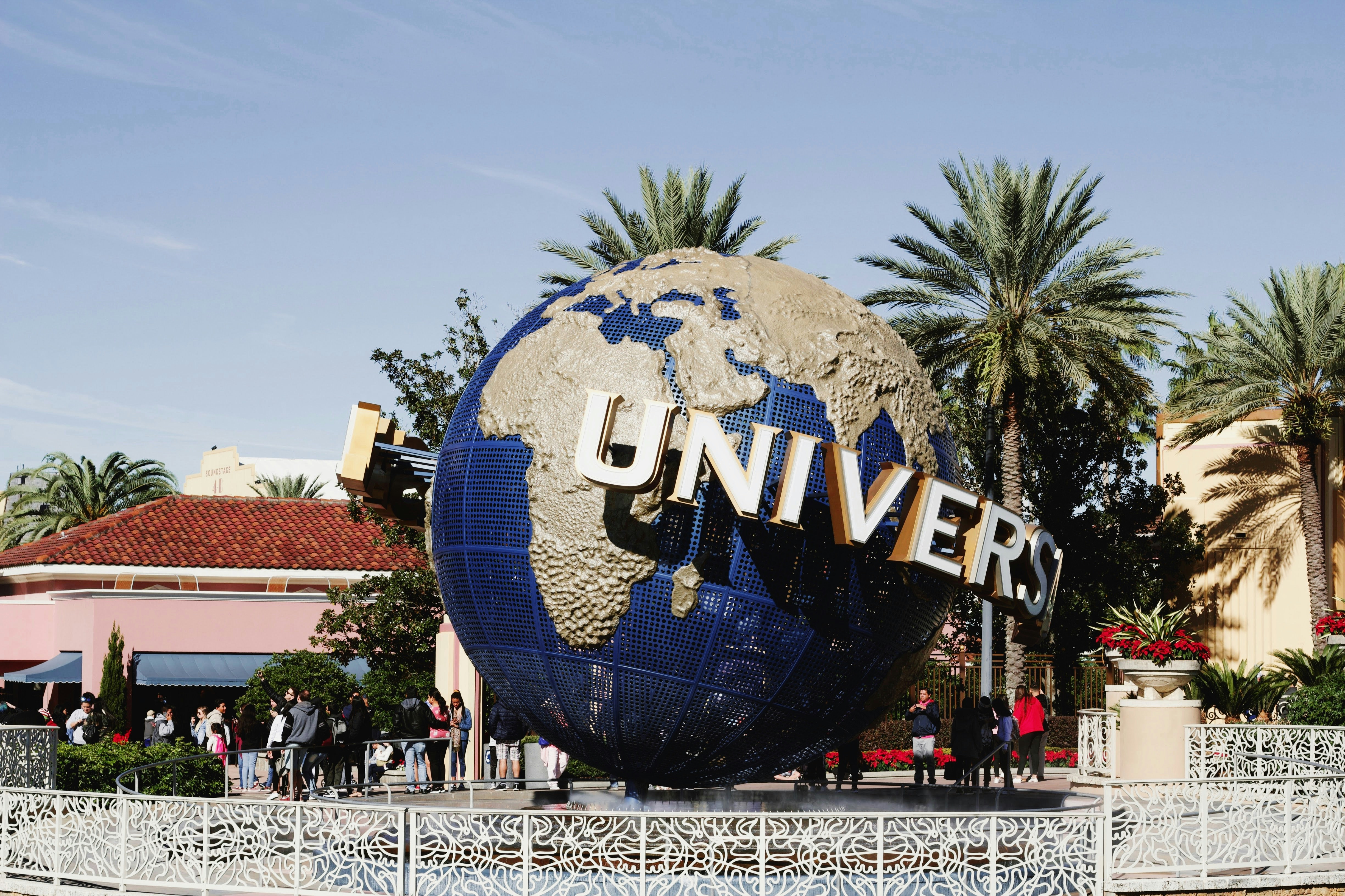 A large blue and white globe with the word universal on it photo – Free ...