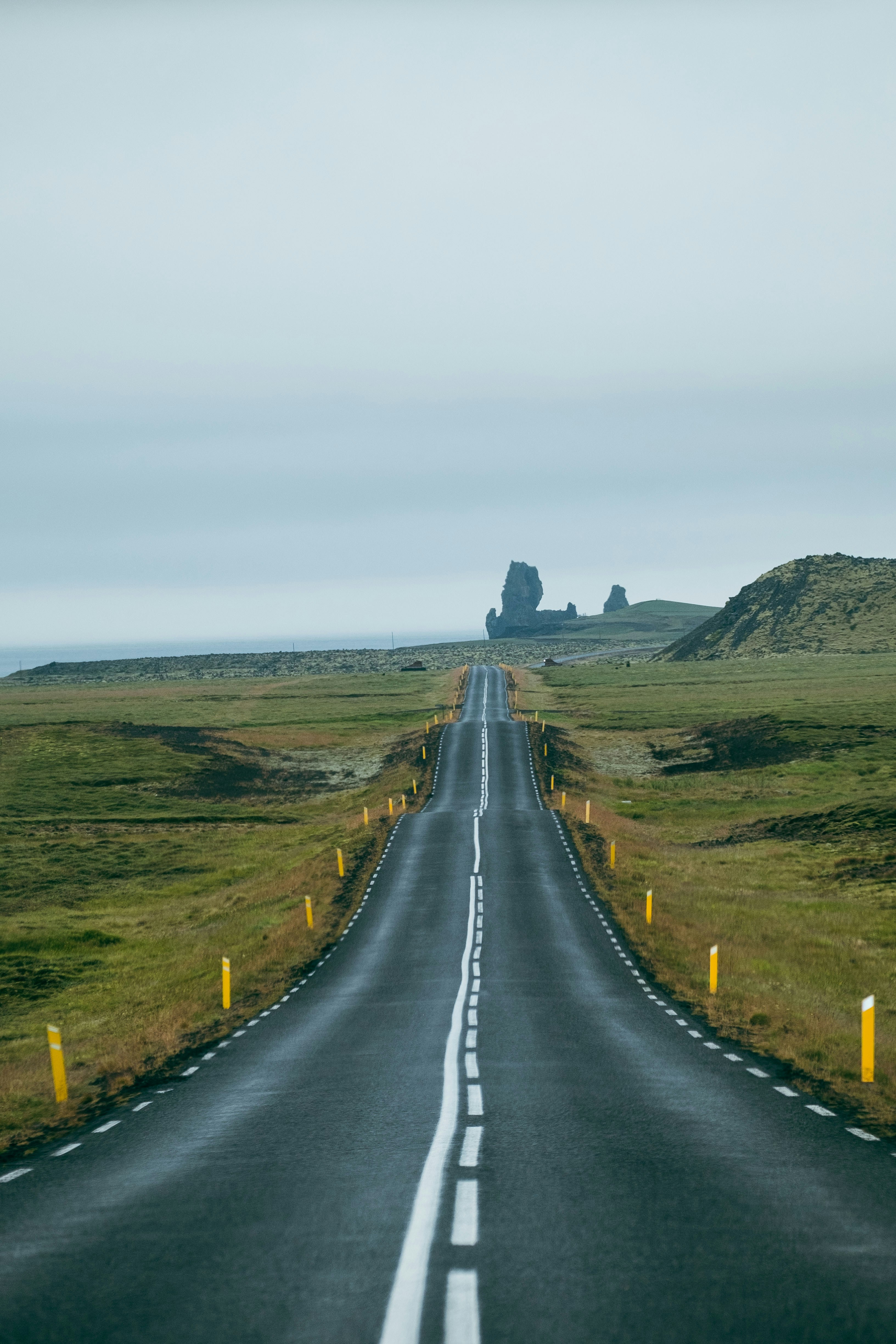 a long straight road in the middle of nowhere