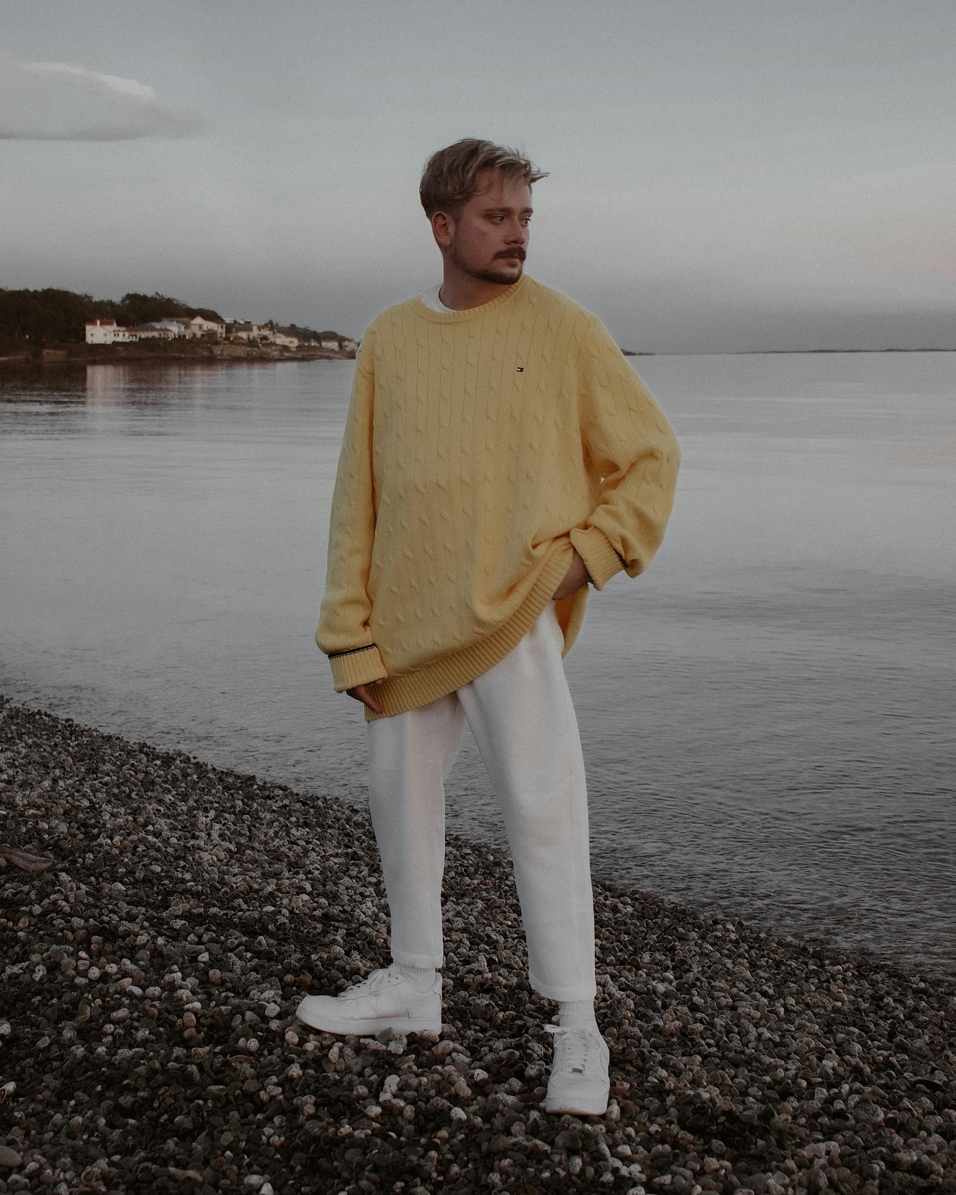 Mustard Knit by the Sea: a contemplative coastal portrait