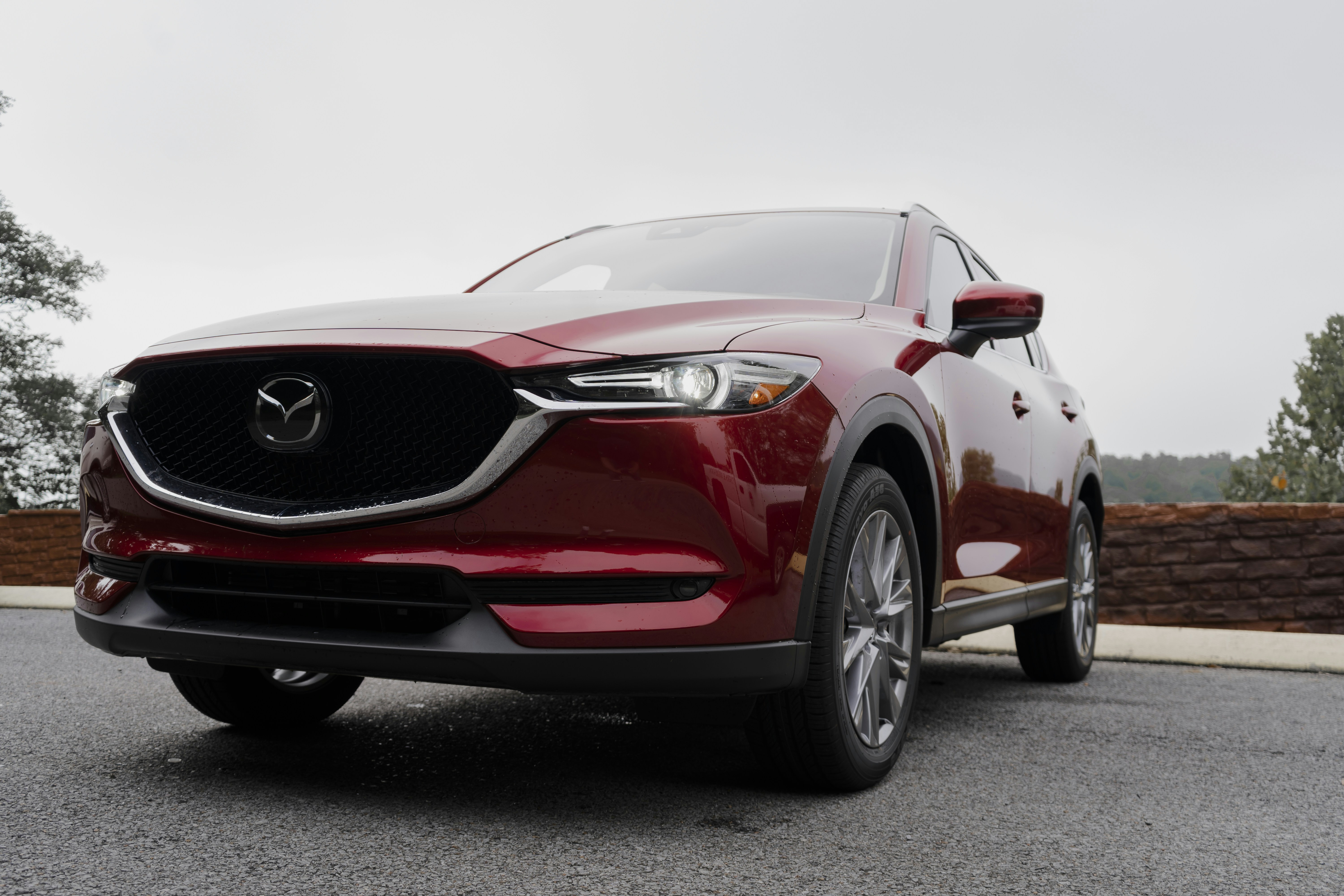 A red mazda cx - 5 parked in a parking lot photo – Free Tn Image on ...