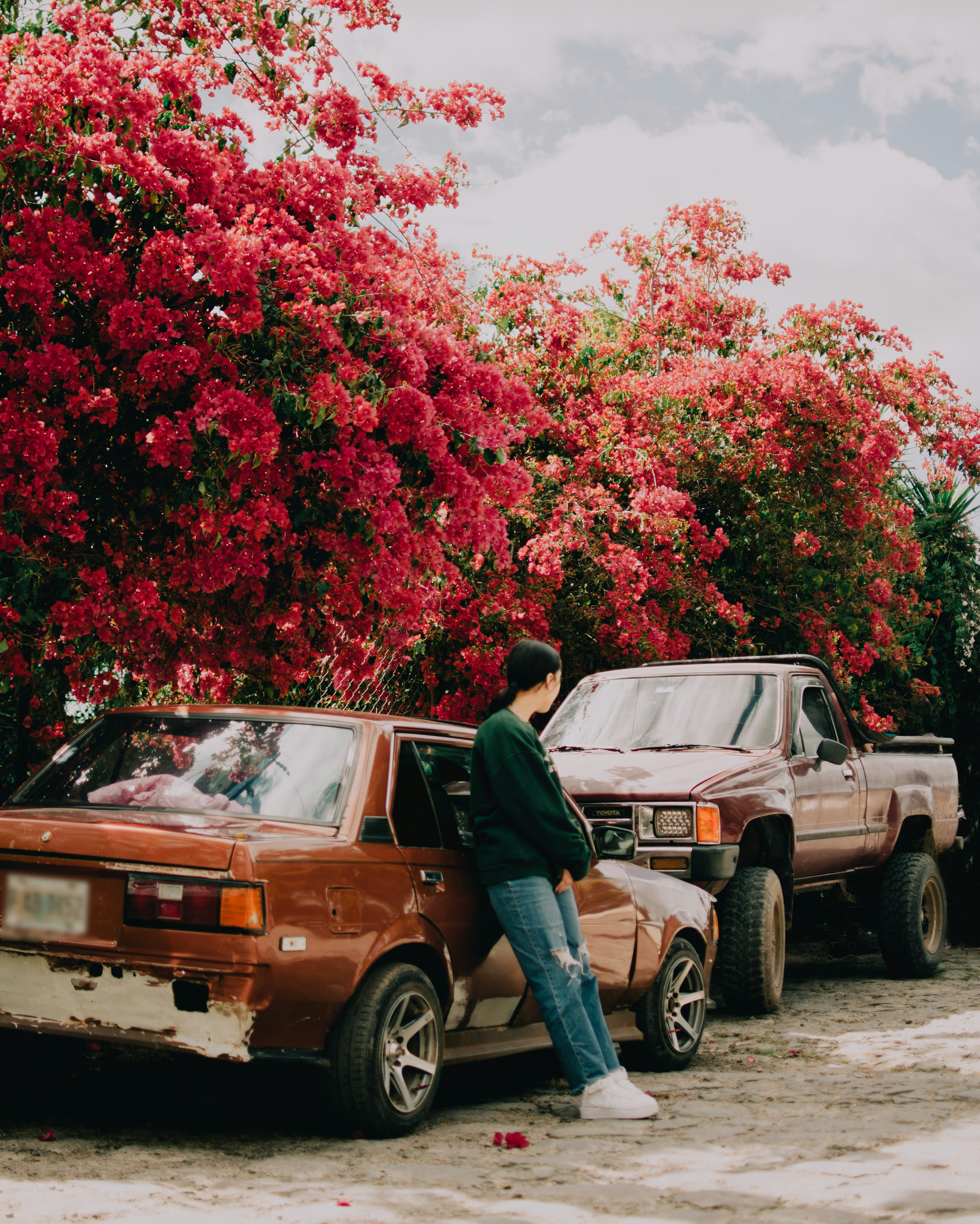 a man sitting in the back of a truck