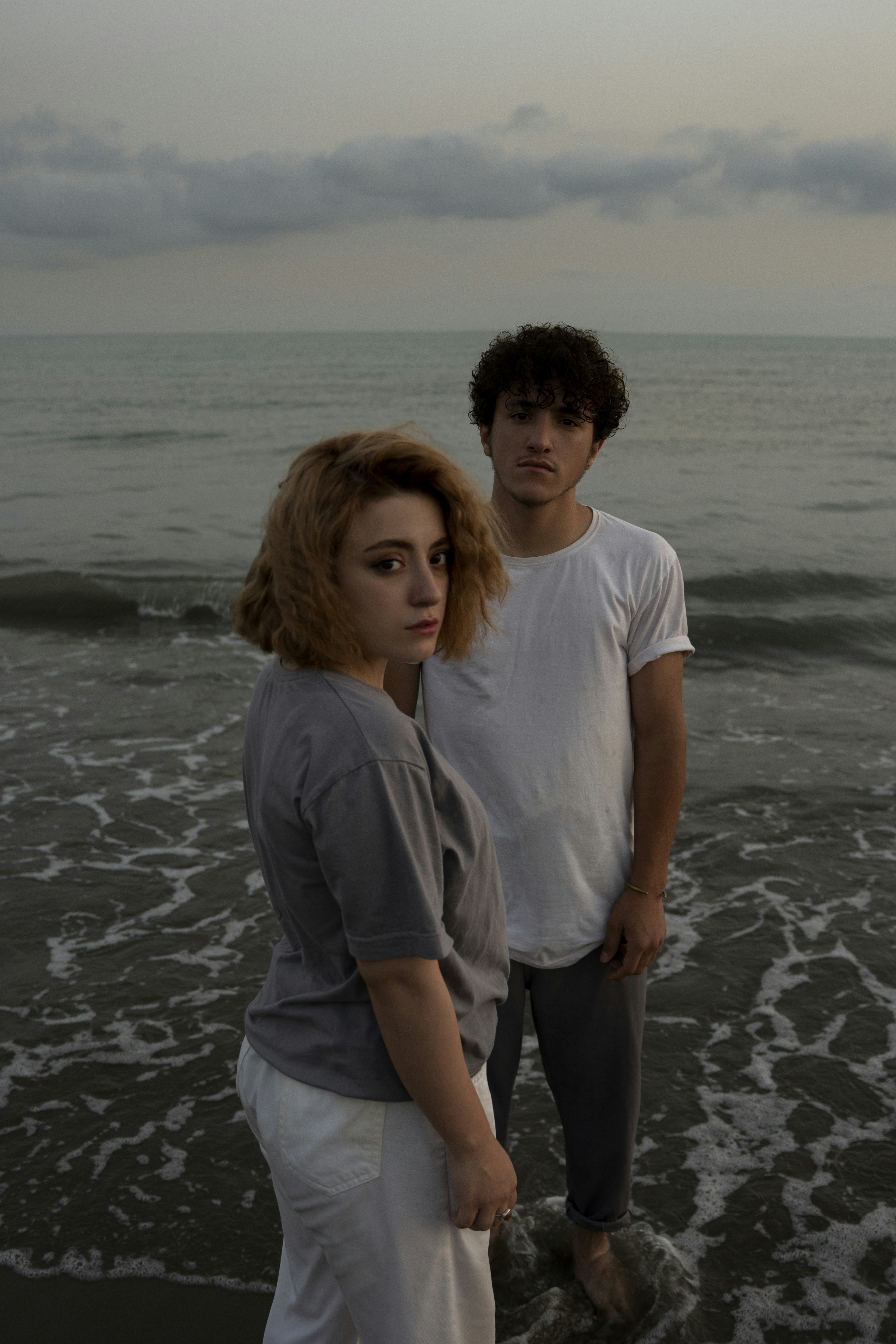Dusk by the Shore: A Foreground Portrait at the Waterline