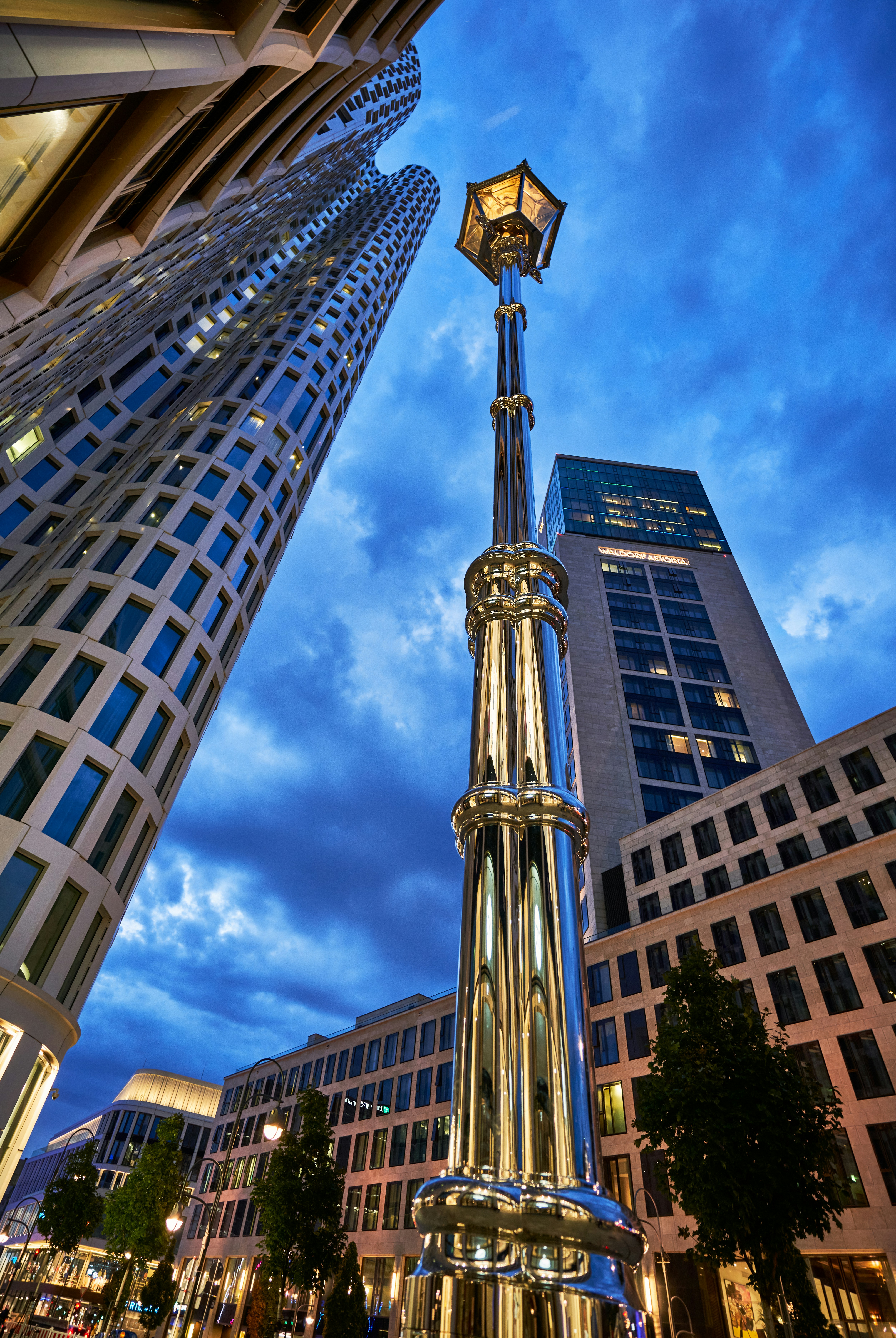 a very tall tower with a clock on it's side