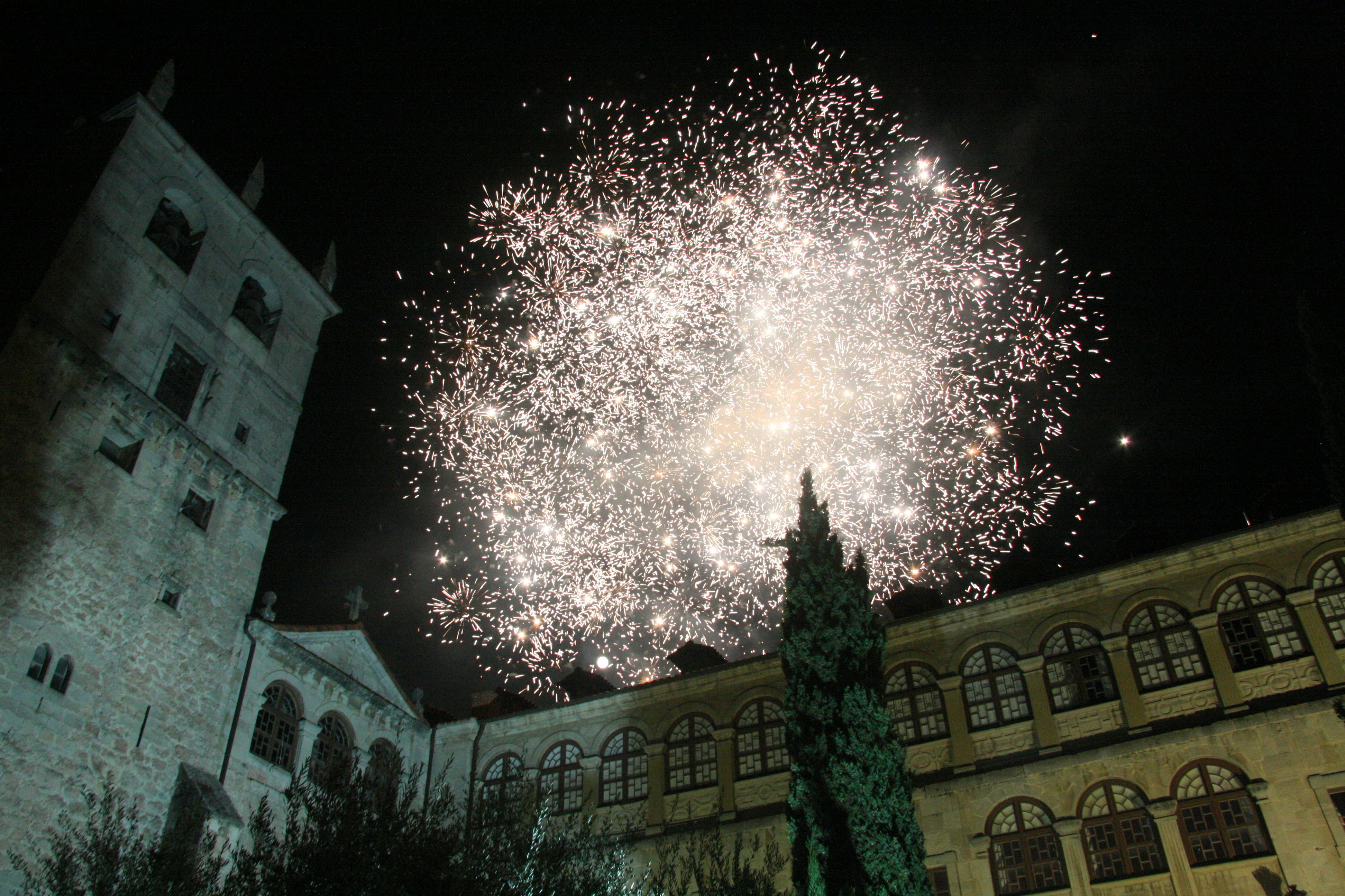 A large fireworks is lit up in the night sky photo – Free Fuego Image ...