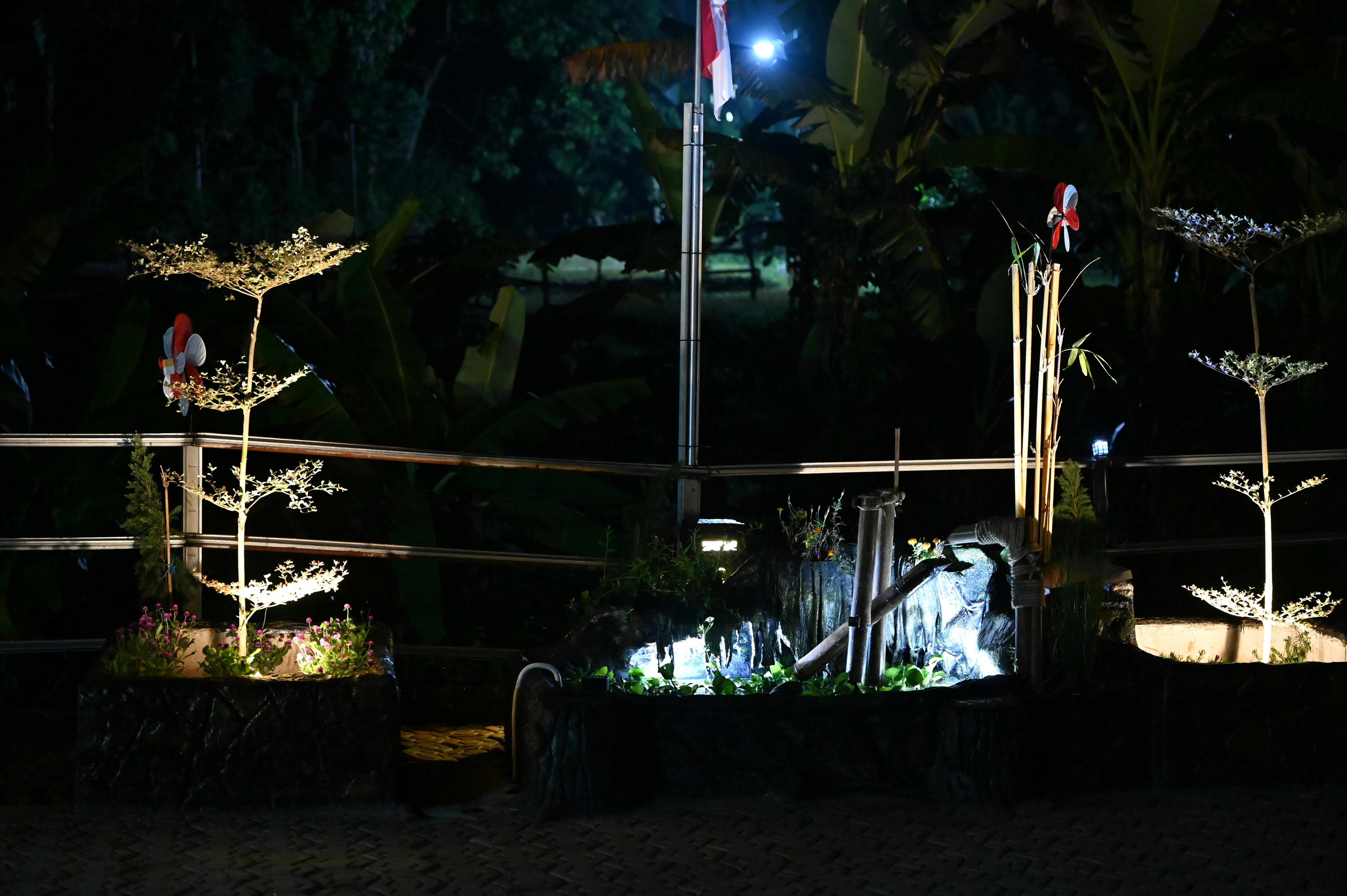Night garden centerpiece under soft illumination