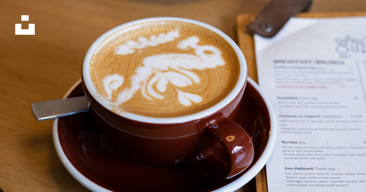 Deux Tasses De Cappuccino Sont Posées Sur Une Table Photo Photo