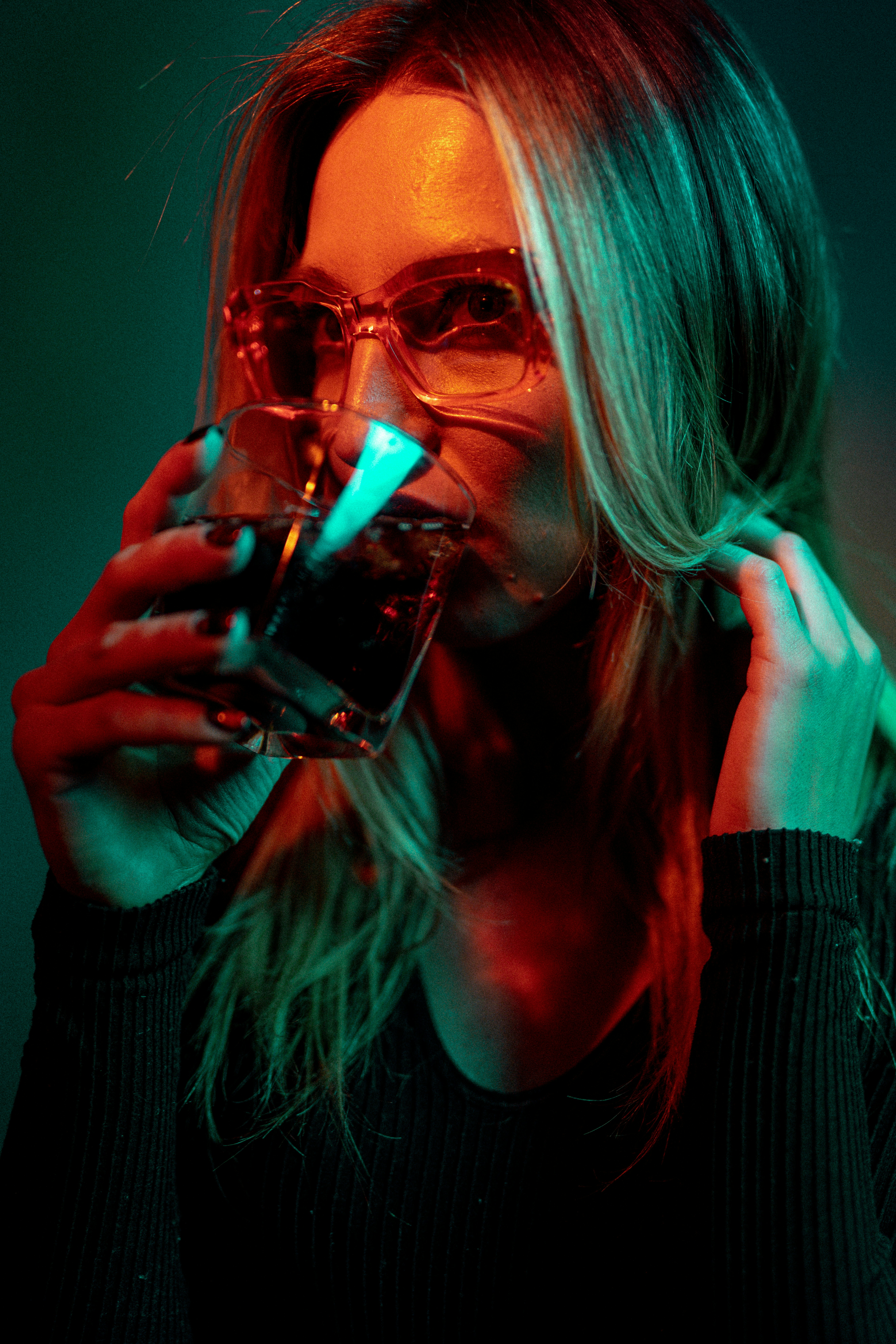 Amber Glass: A Neon-Glimmed Portrait in Low Light