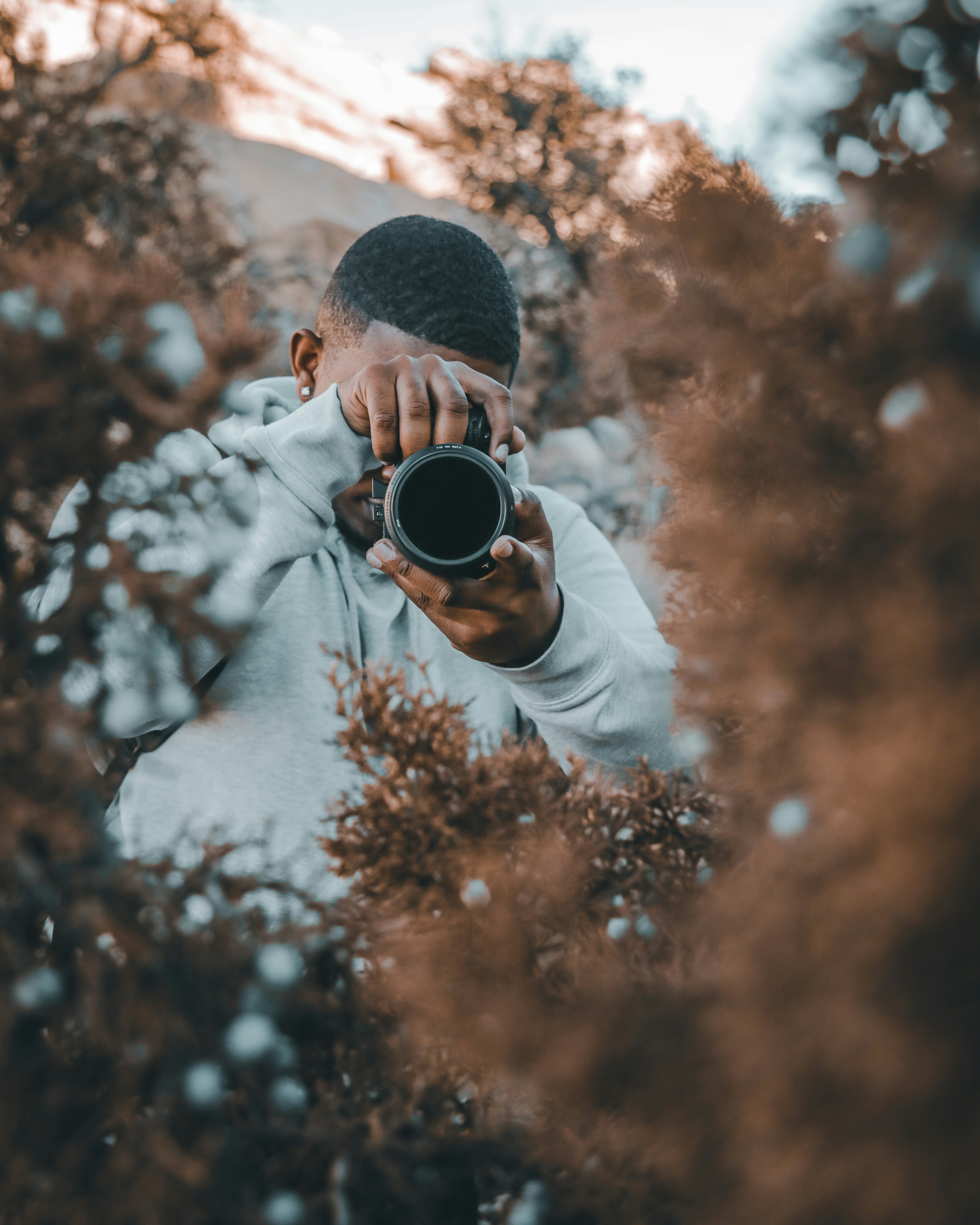 a man taking a picture of himself with a camera