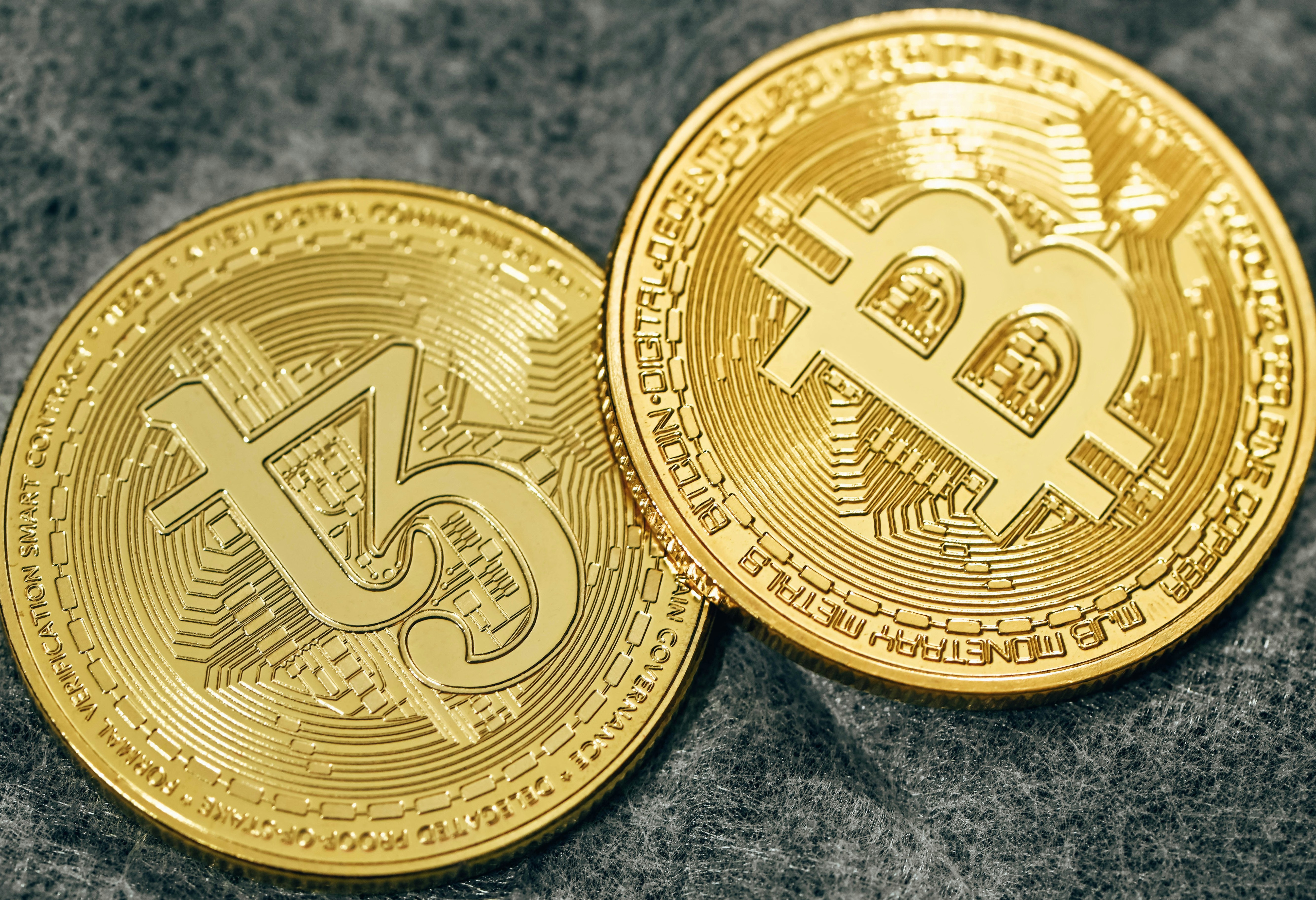 Two gold bitcoins sitting side by side photo – Free Business Image on ...