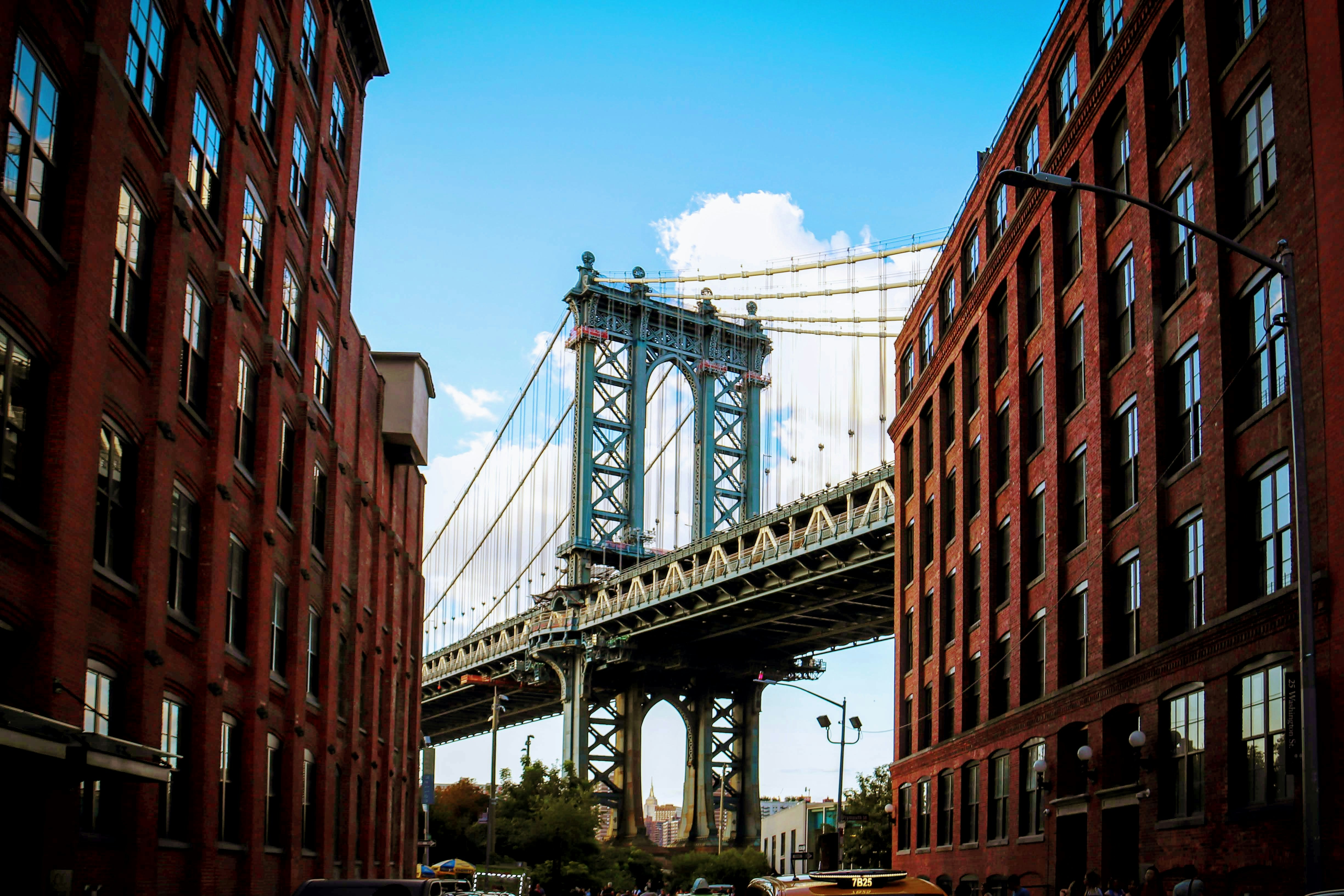 A view of a bridge over a city street photo – Free Building Image on ...