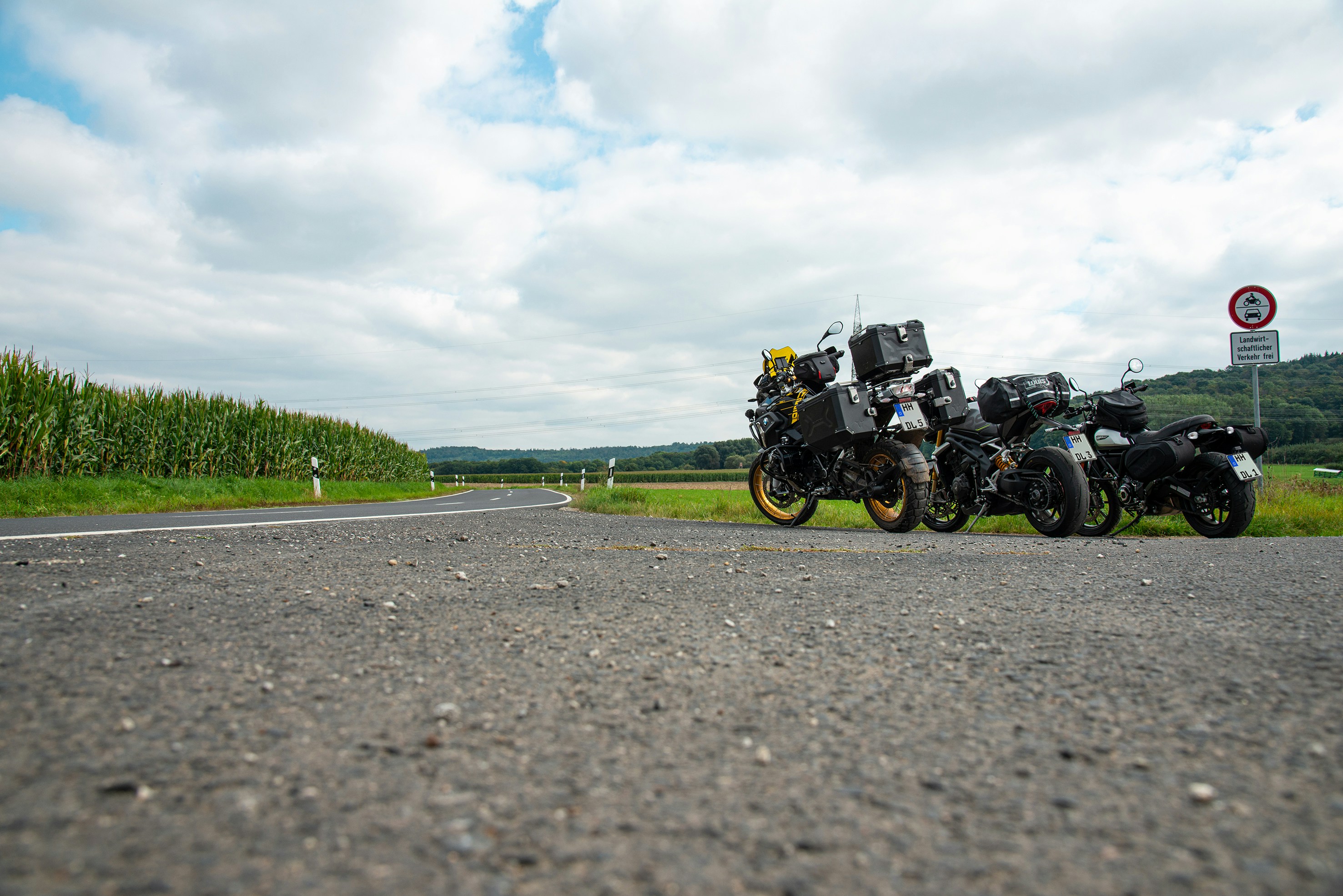 Two motorcycles parked on the side of the road photo – Free Motorcycle ...