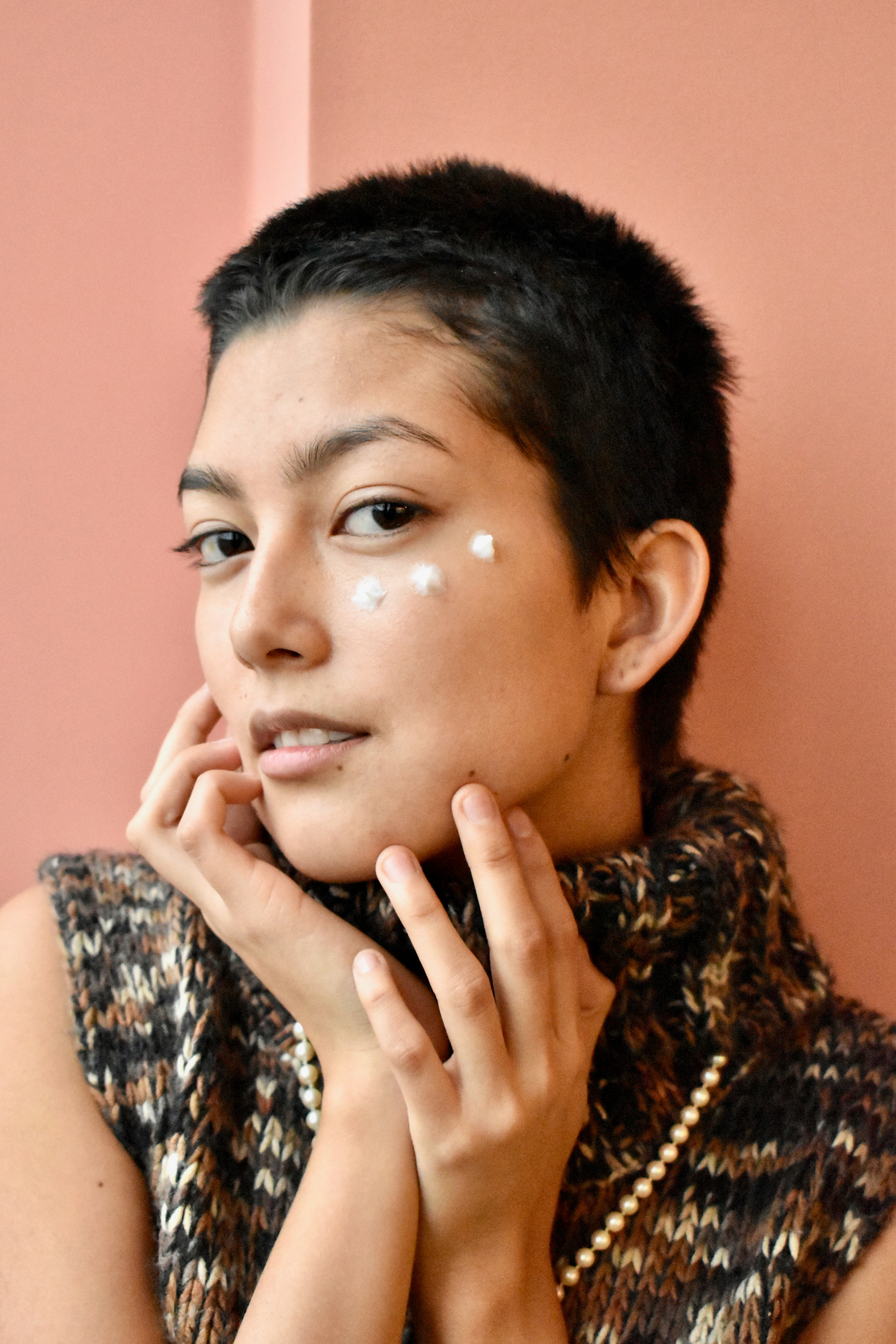 A woman with a white spot on her face photo – Free Skin care Image on ...