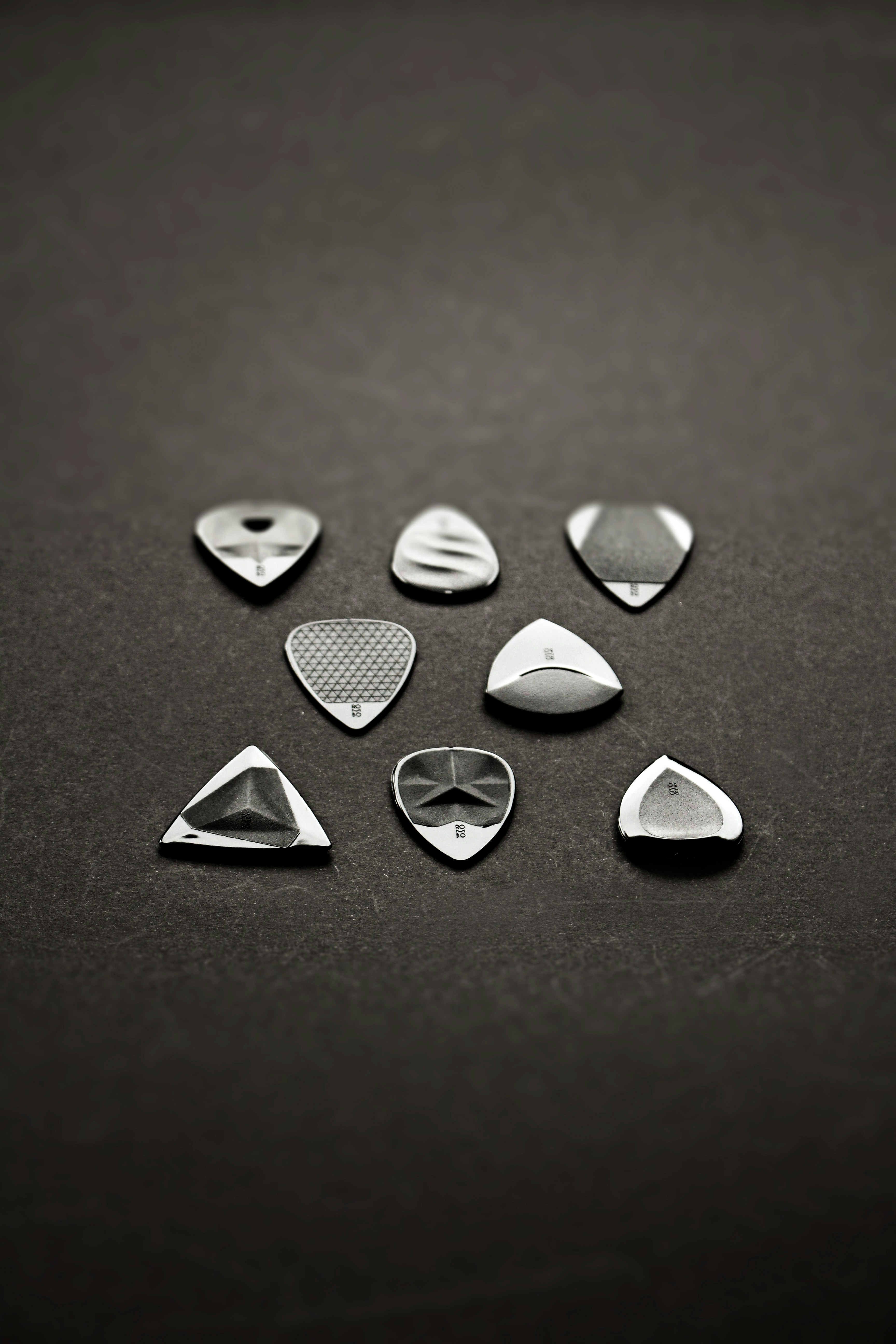 A bunch of different shapes and sizes of buttons photo – Free Plectrum ...