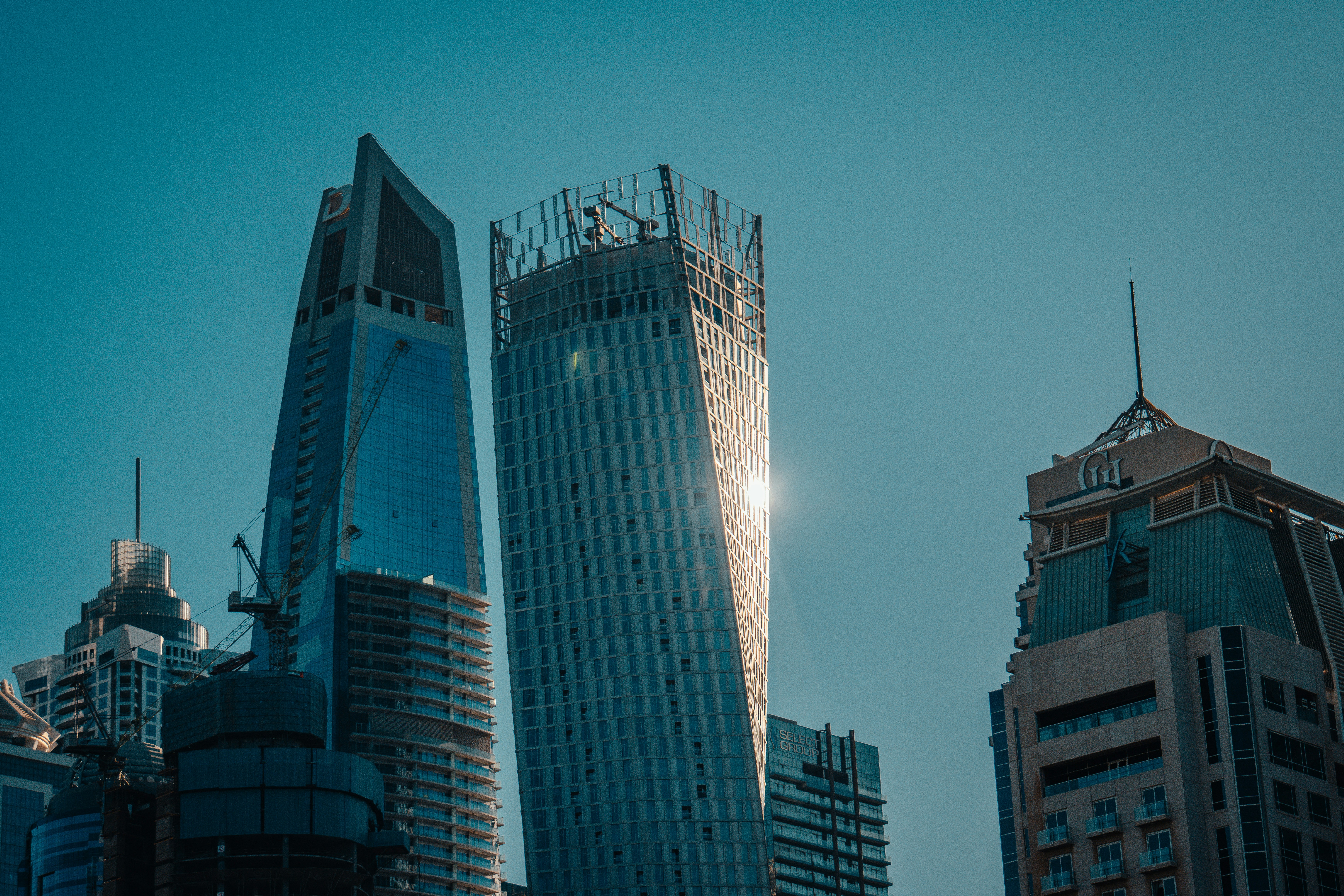 A group of tall buildings in a city photo – Free Building Image on Unsplash
