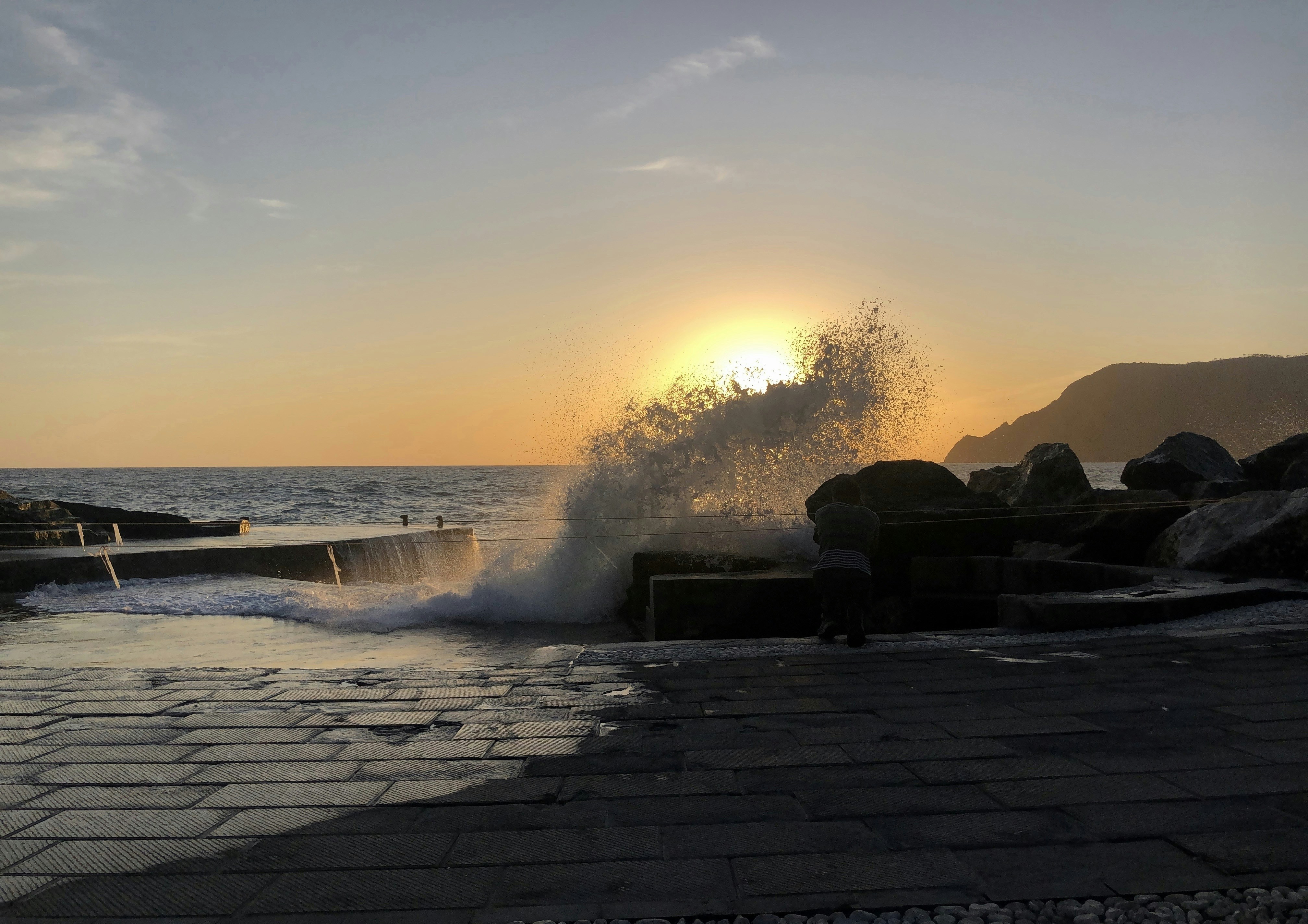 Ocean spray at sunset