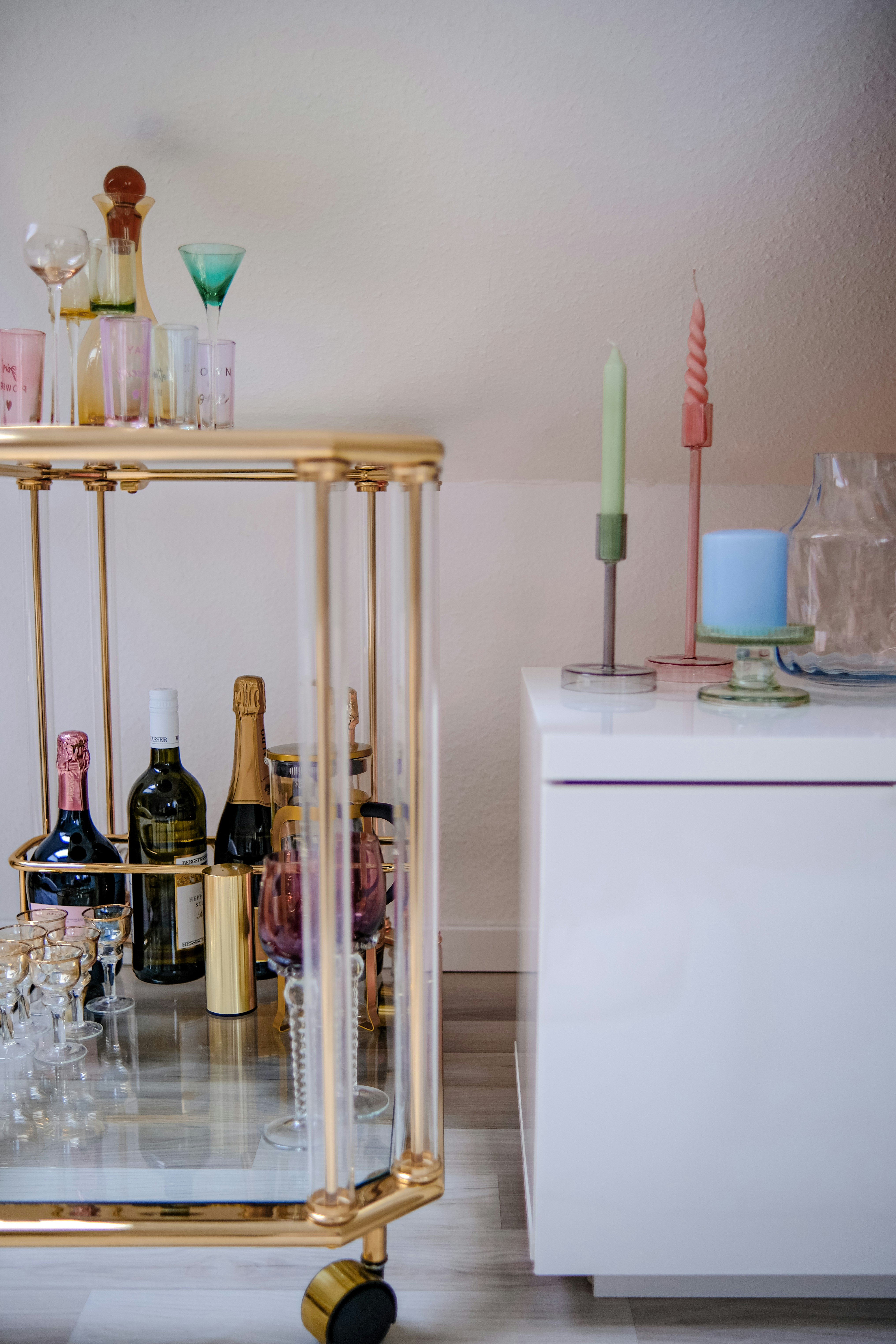 Glint and Glass: A Golden Bar Cart in Soft Domestic Light