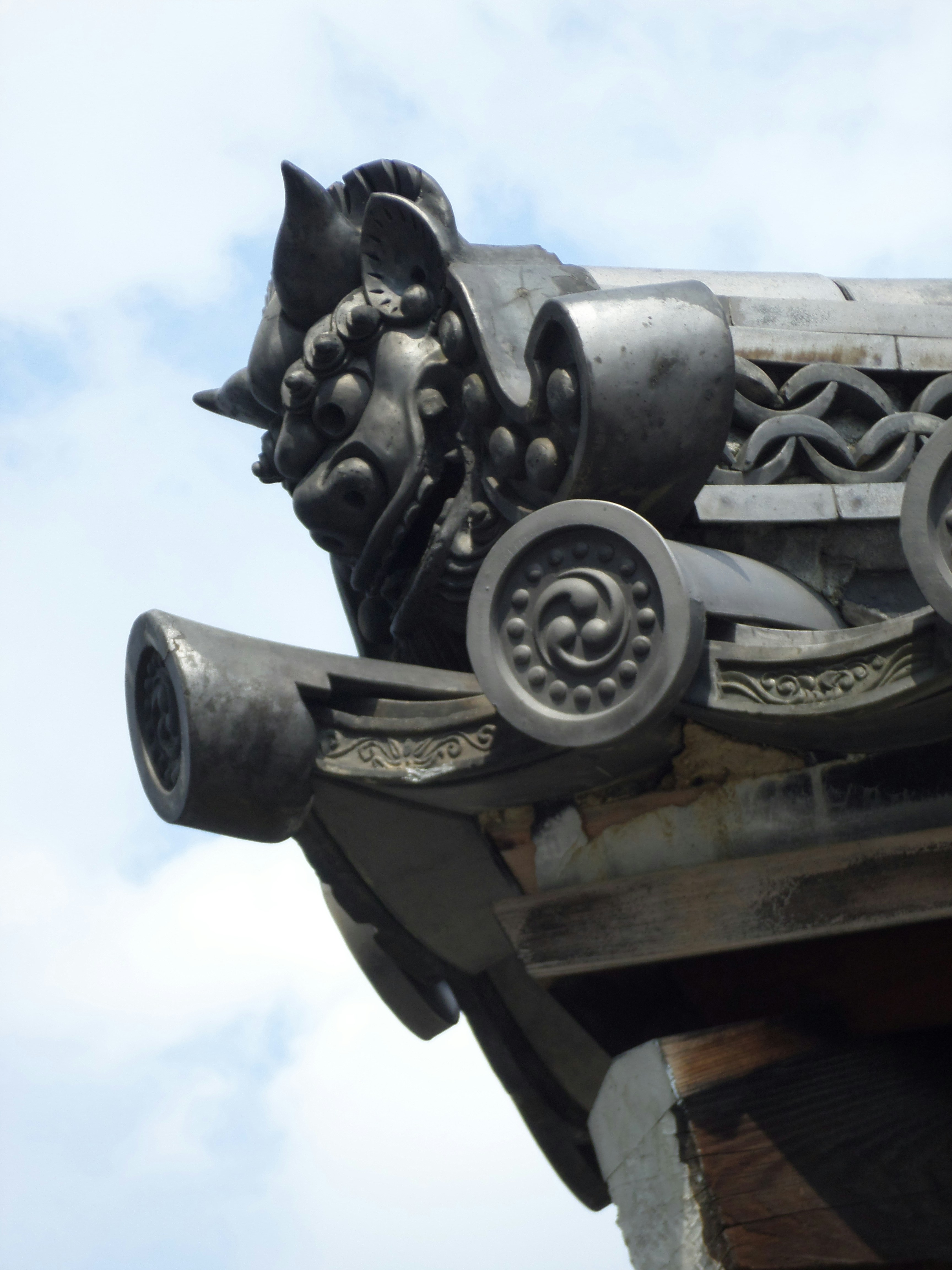 A close up of a gargoyle on the roof of a building photo – Free Kyoto ...
