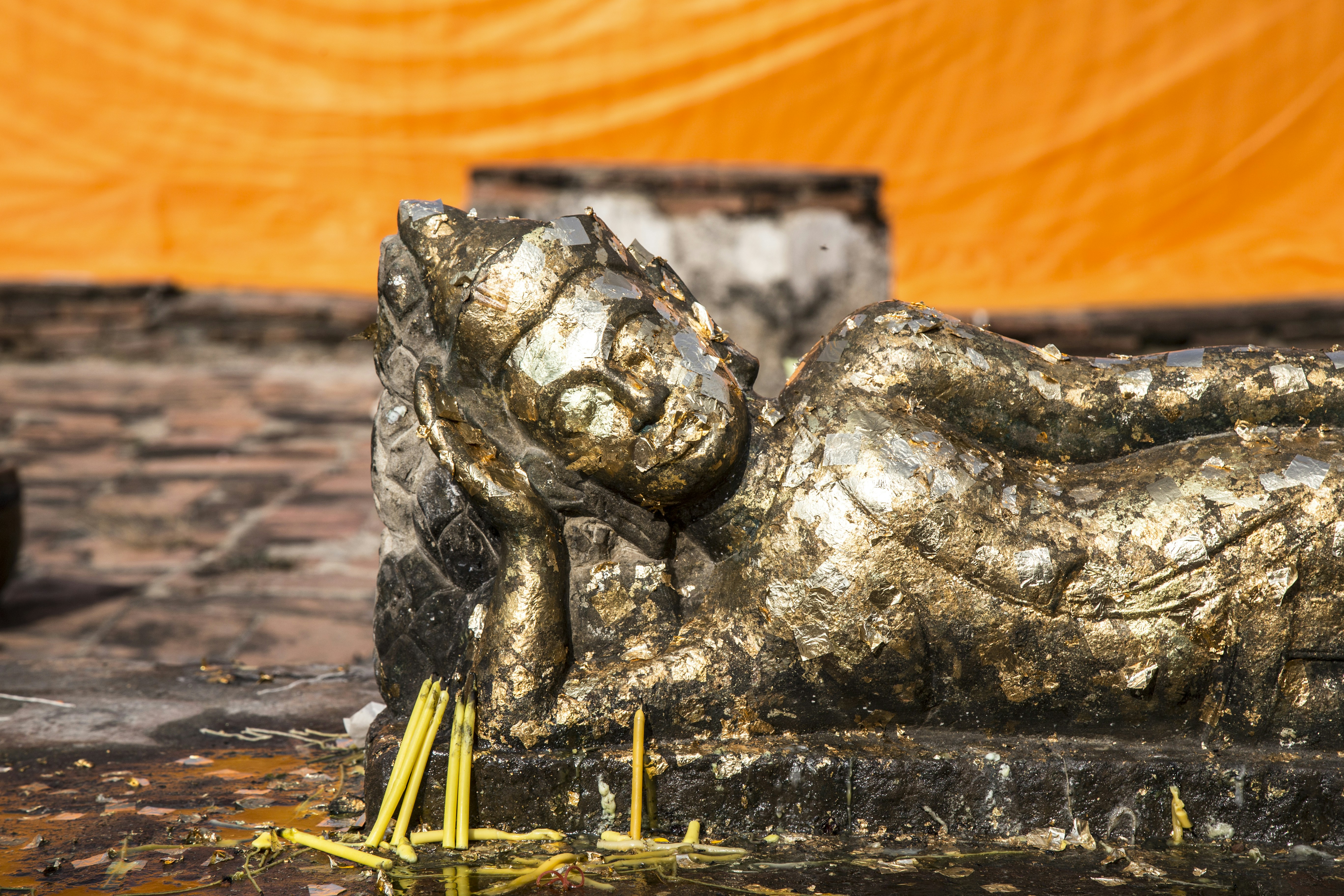 A statue of a person laying down on the ground photo – Free Ayutthaya ...