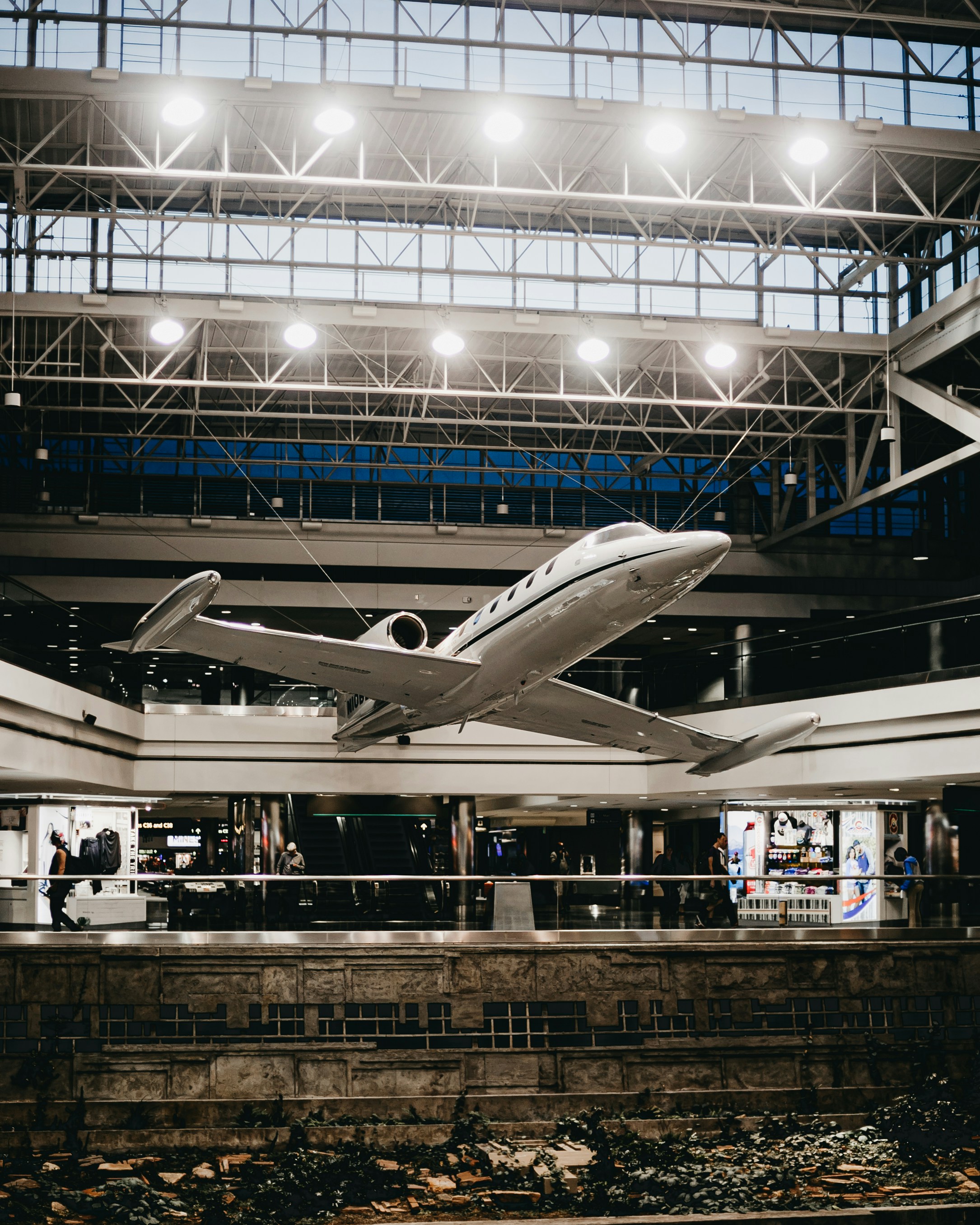 Jet in the Atrium: An Airliner Soaring Above a Modern Terminal