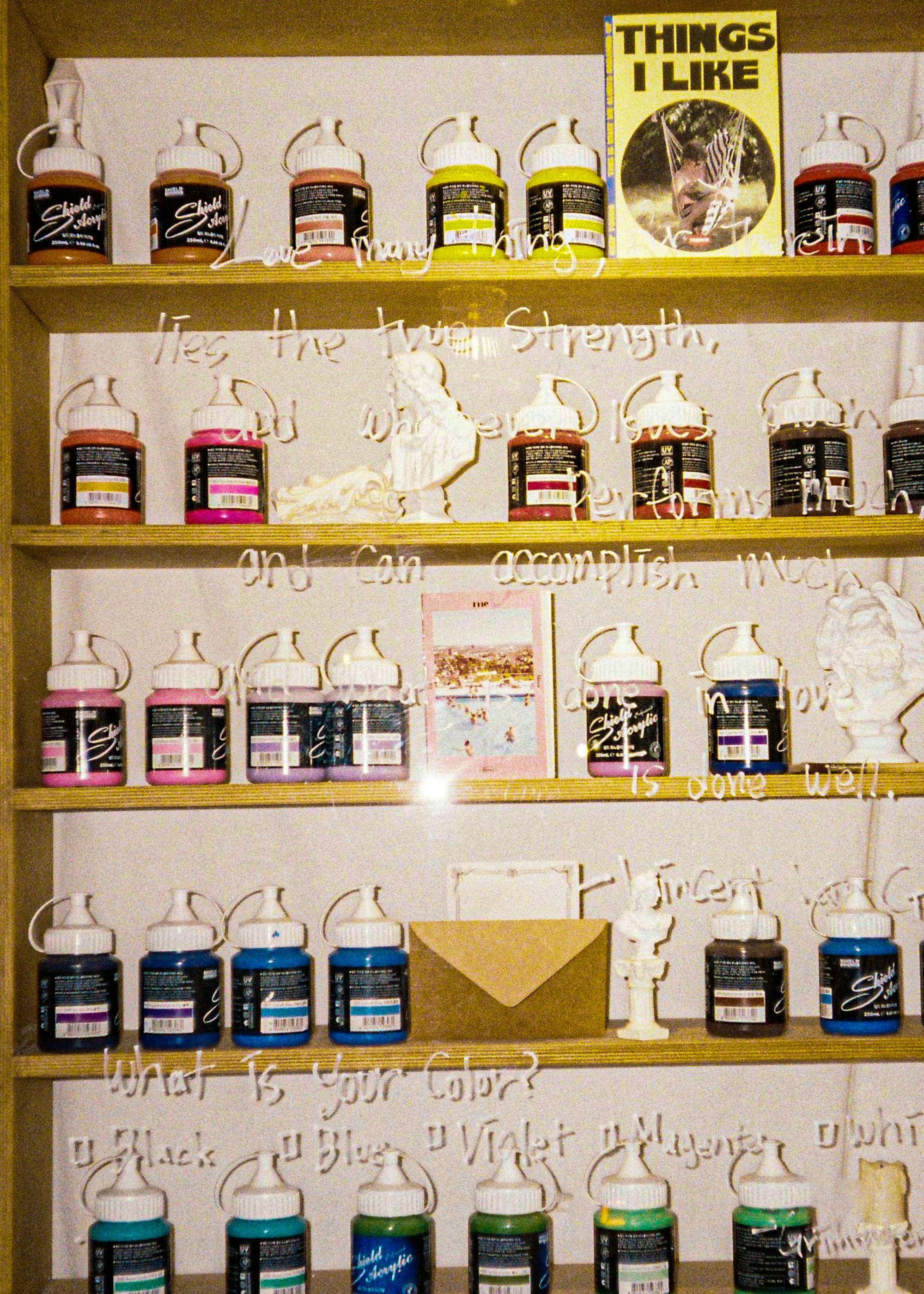 a shelf filled with lots of different types of medicine