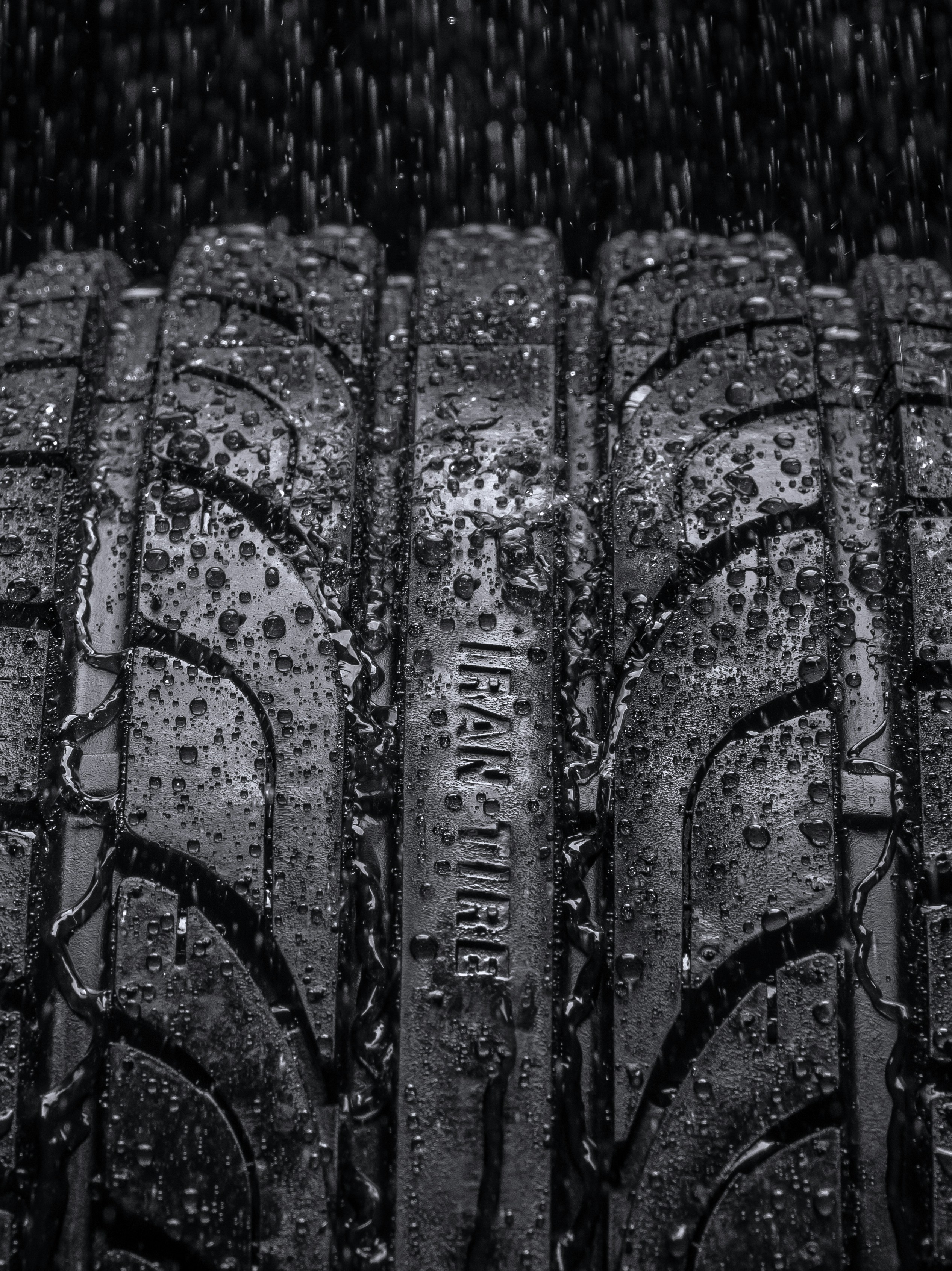 A close up of a tire in the rain photo – Free Freezing Image on Unsplash