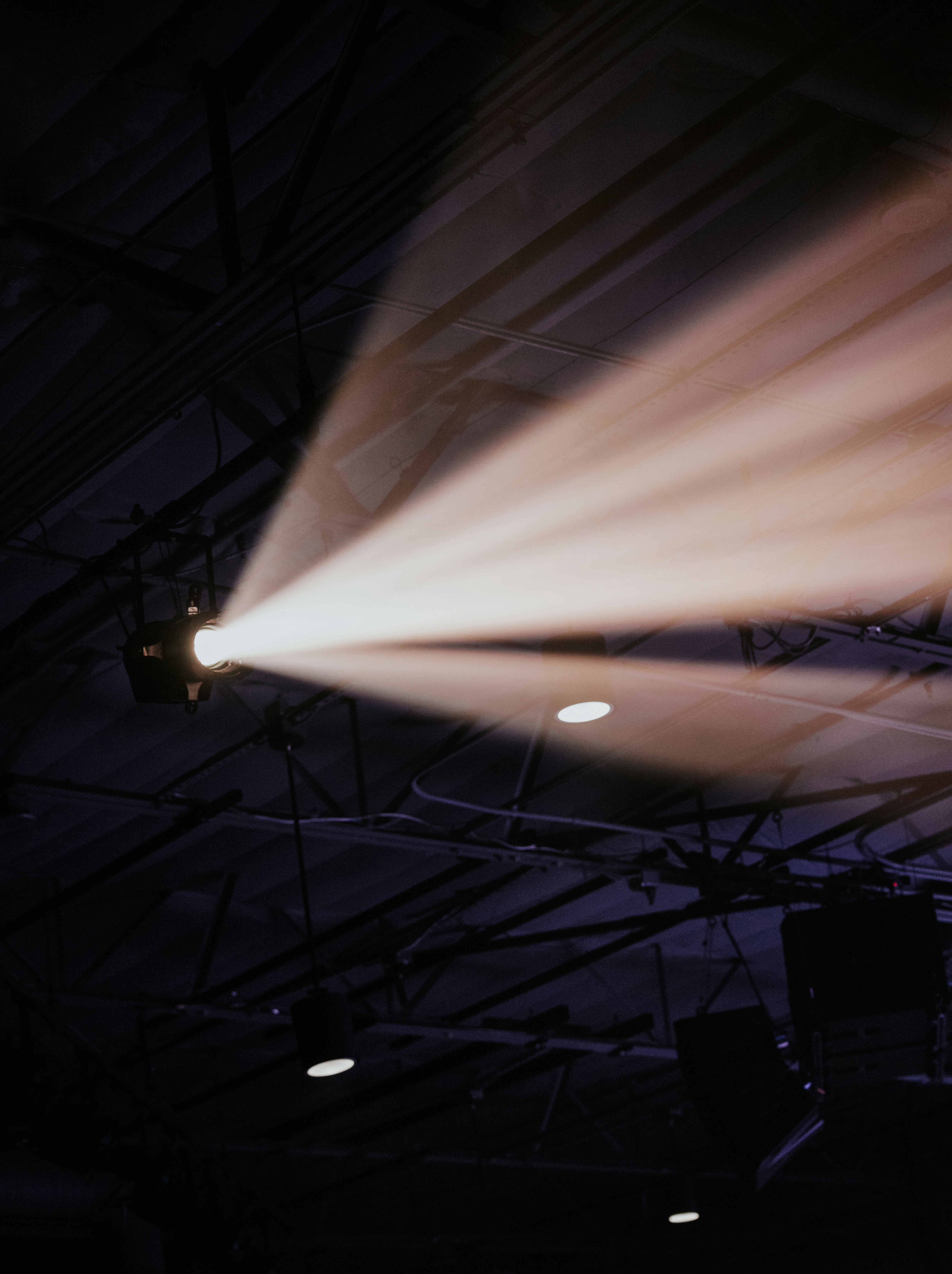 Cone of Light Through the Rigging: A Stage Moment