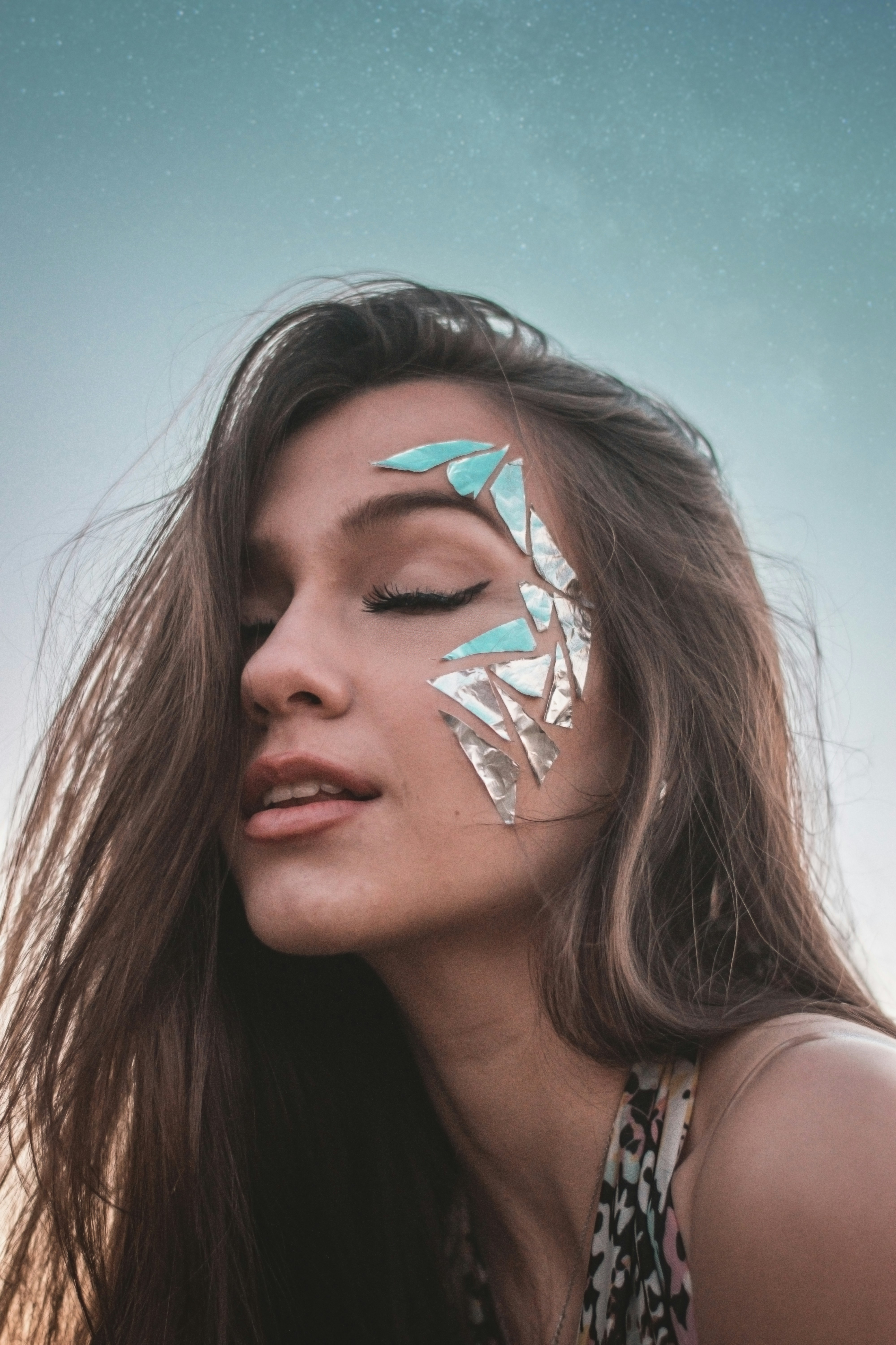 Teal Fragment Portrait: Shards of Light on a Serene Smile