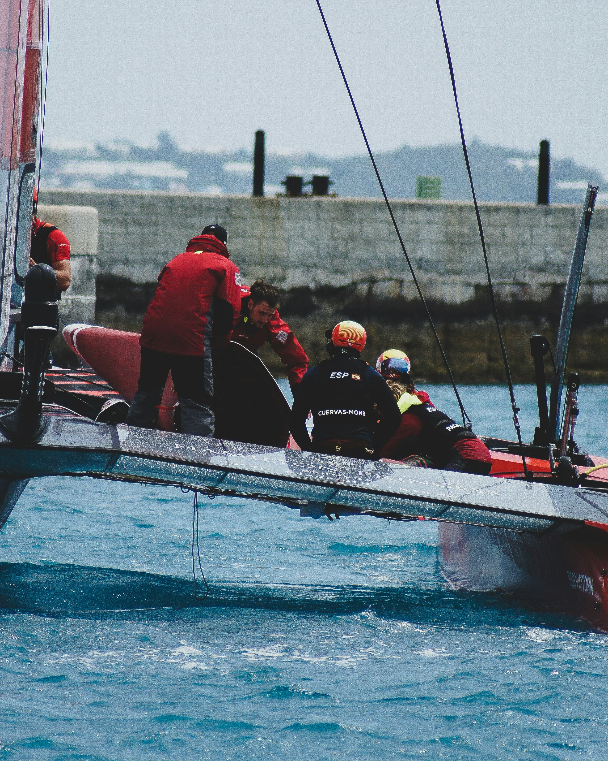 A group of people on a sailboat in the water photo – Free Person Image ...