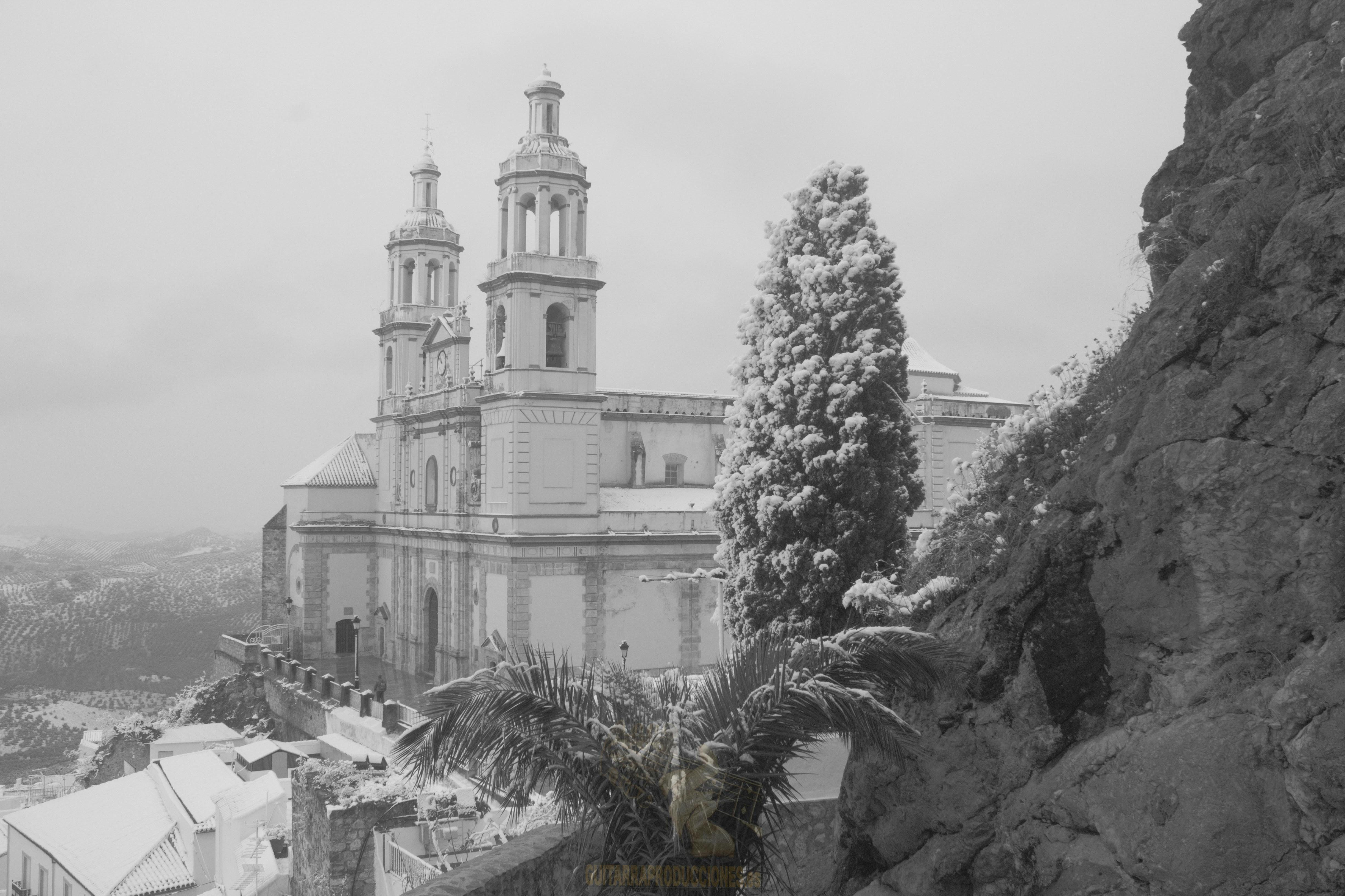 Twin-Towered Basilica Clinging to a Cliffside Vista