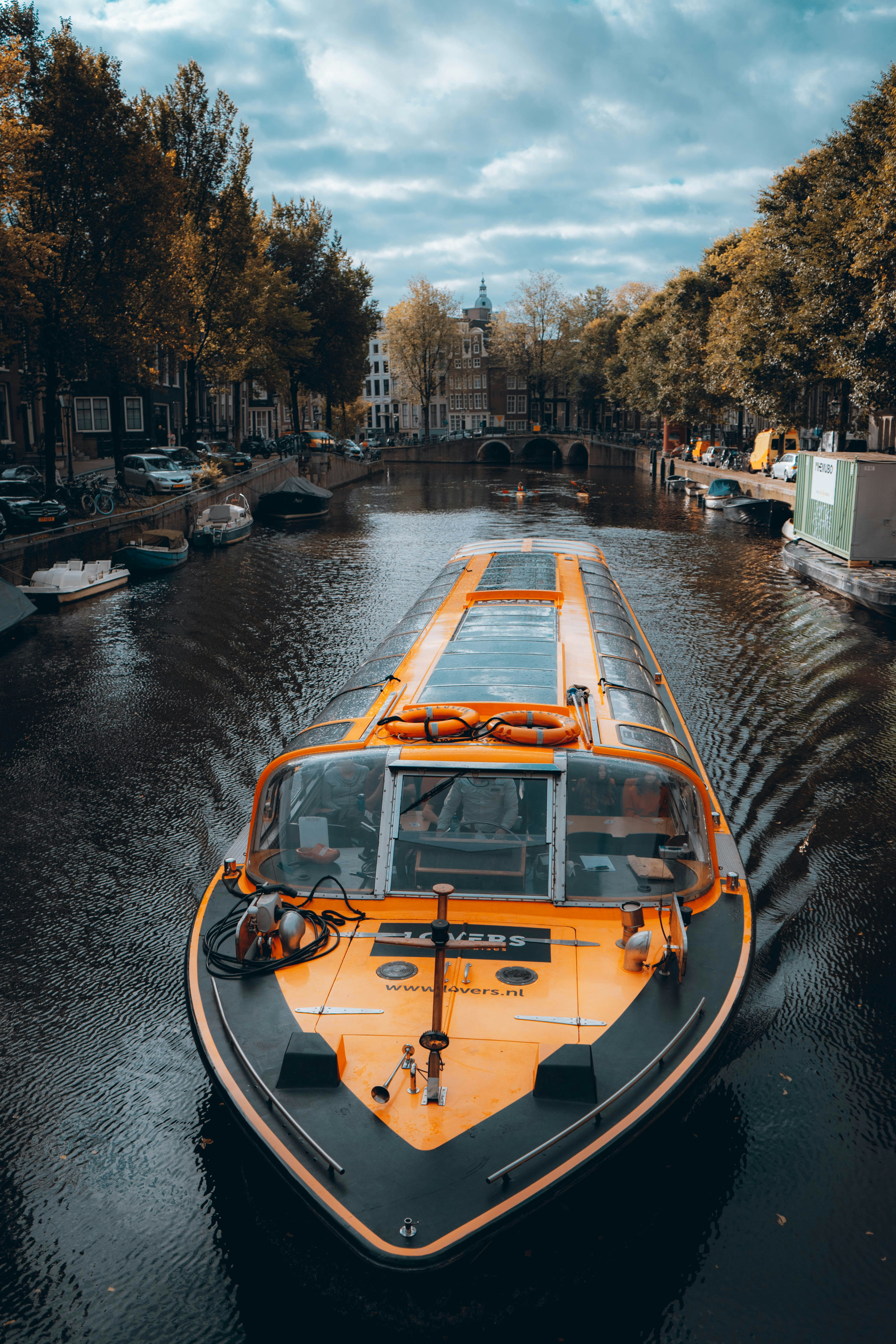 Boat passing on a canal in Amsterdam.