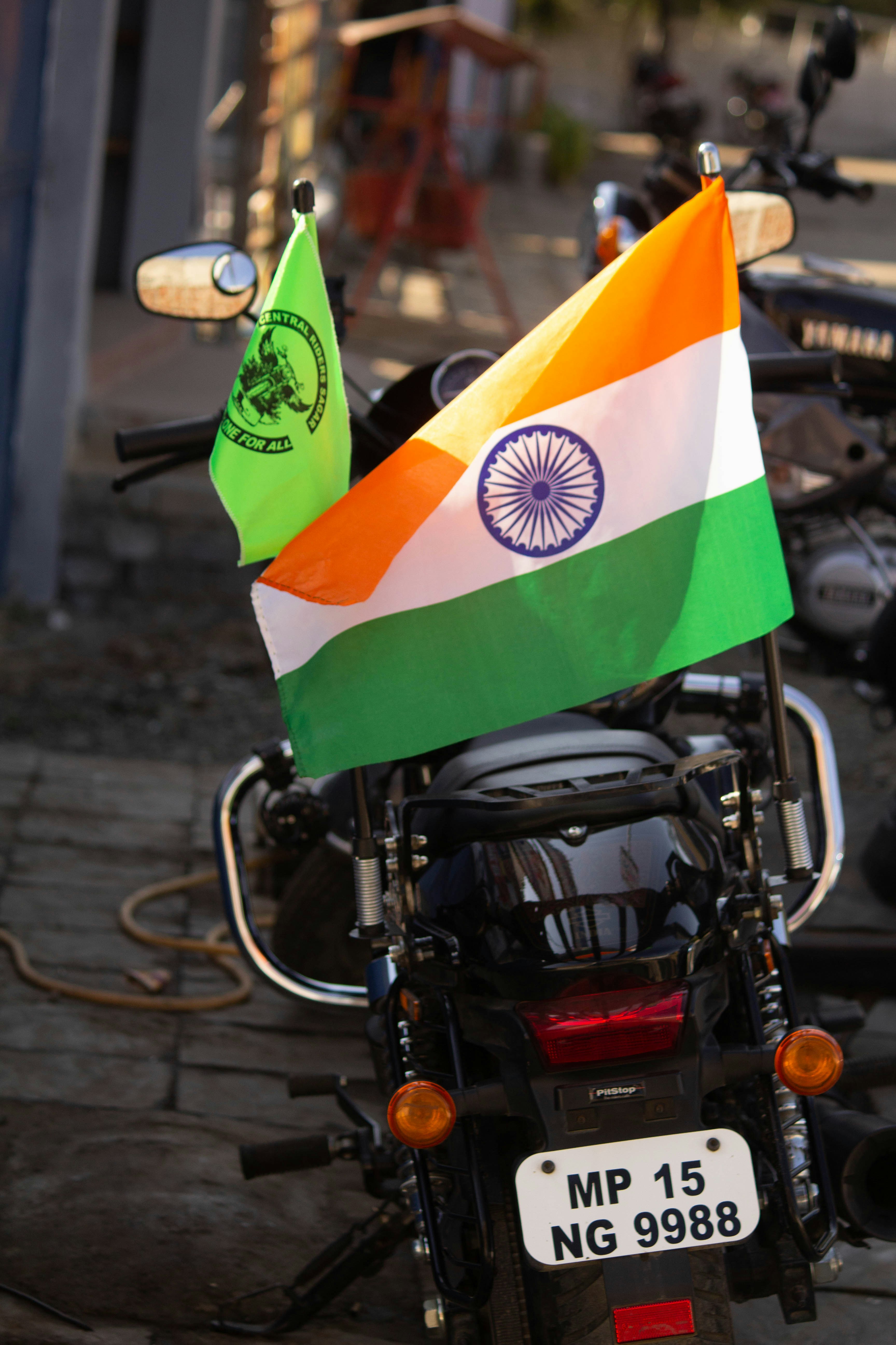 a motorcycle with a flag on the back of it