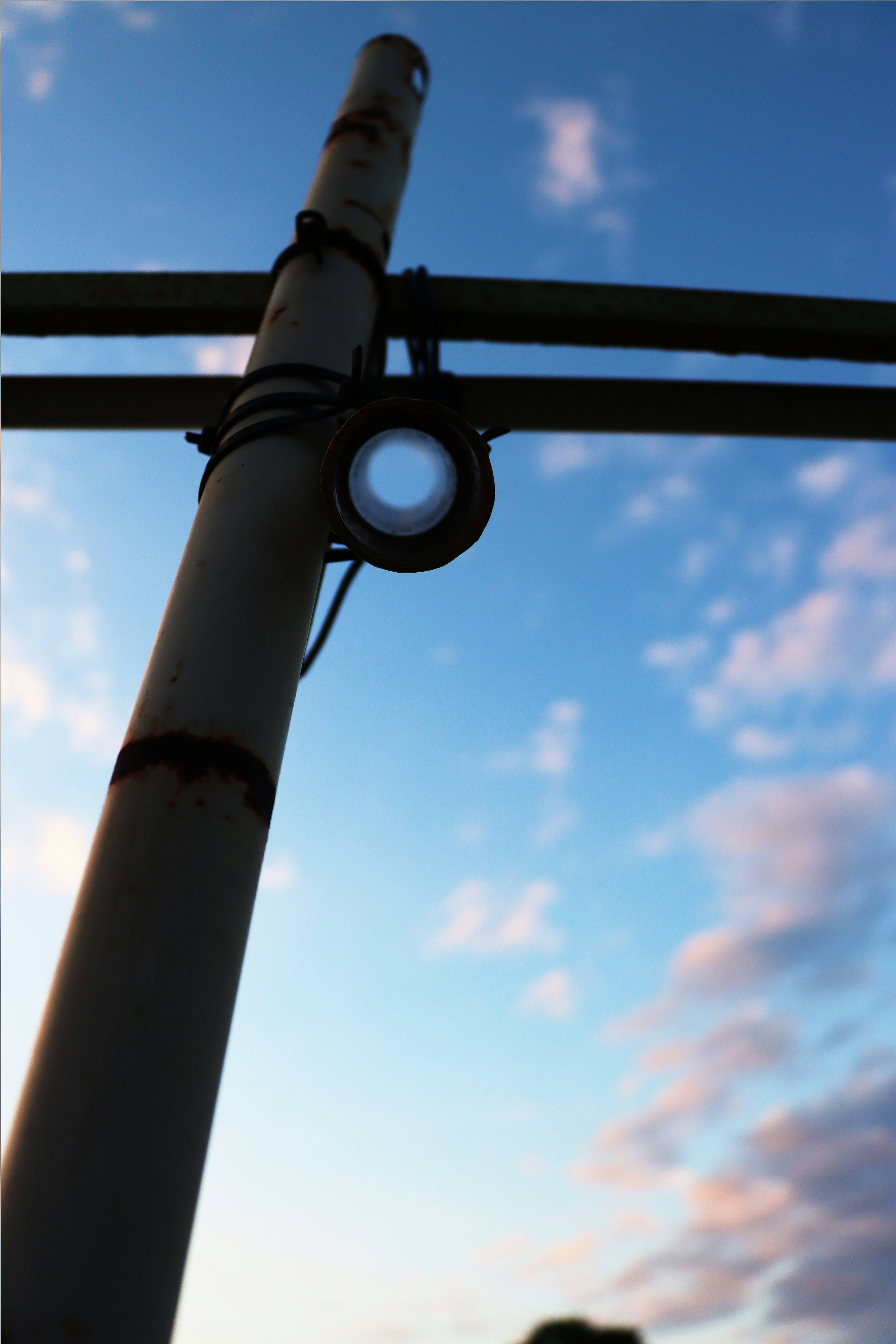 A pole with a light on top of it photo – Free Nim wan road Image on ...