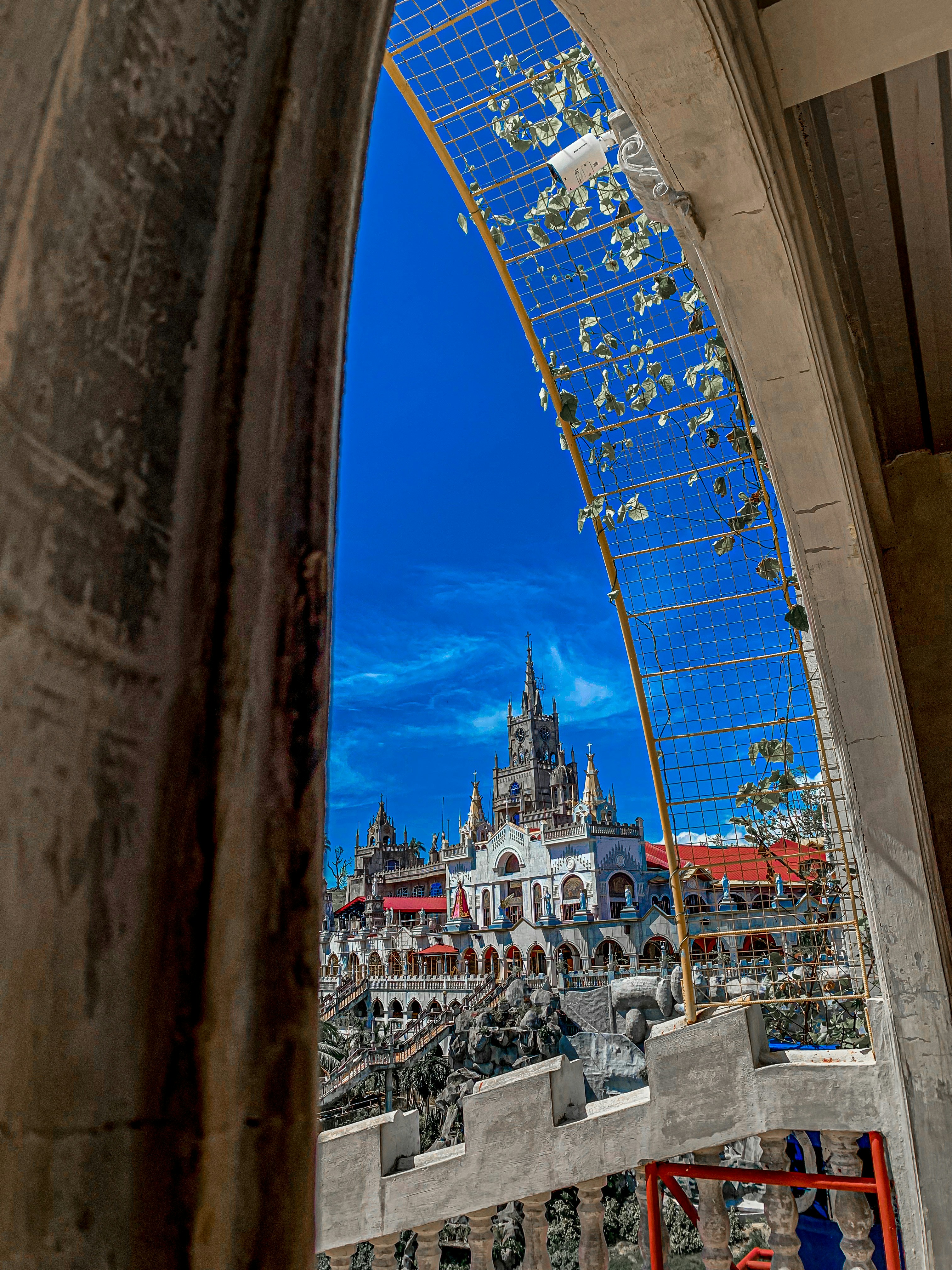 a view of a city through an arch