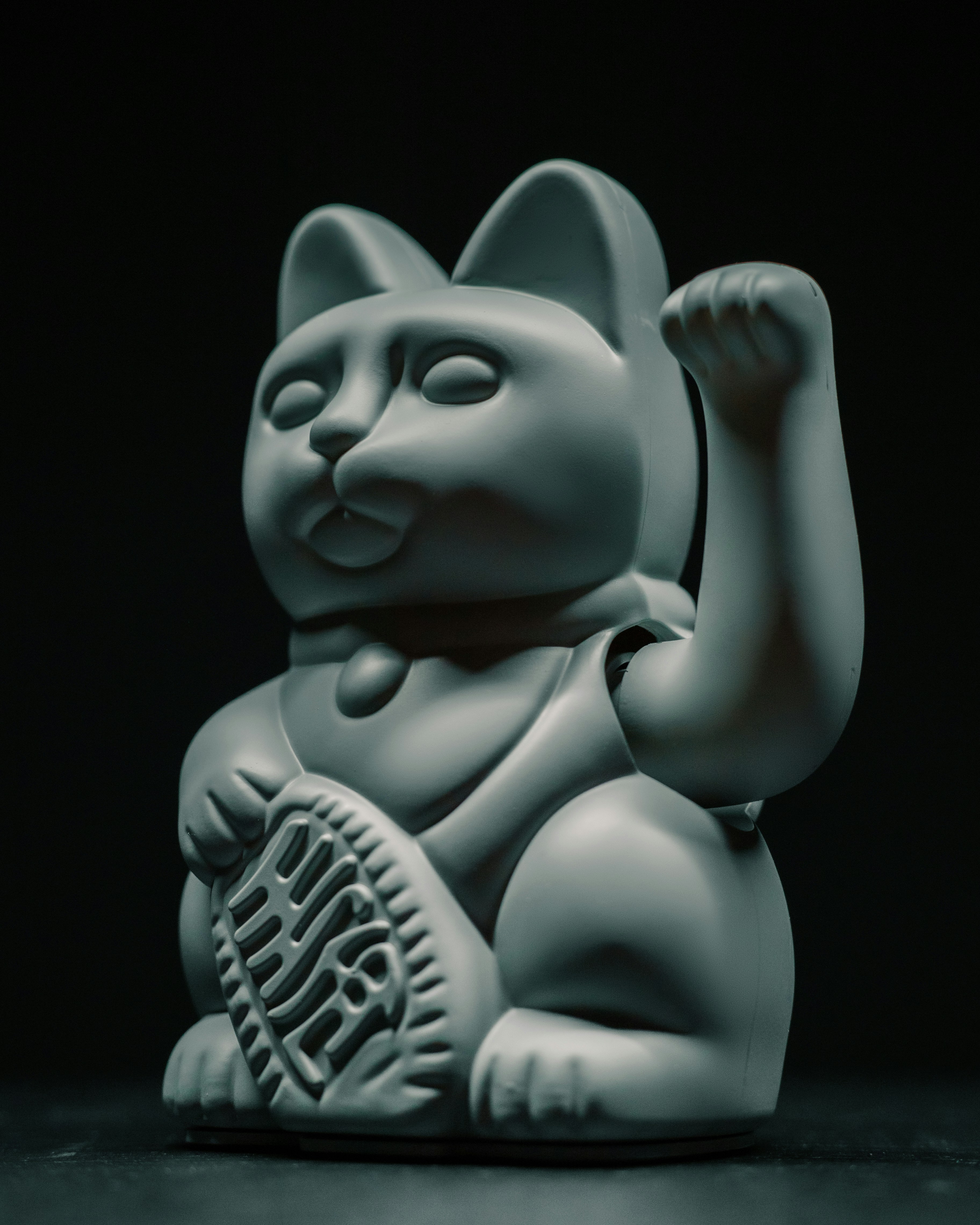 A white cat figurine sitting on top of a table photo – Free Grey Image ...