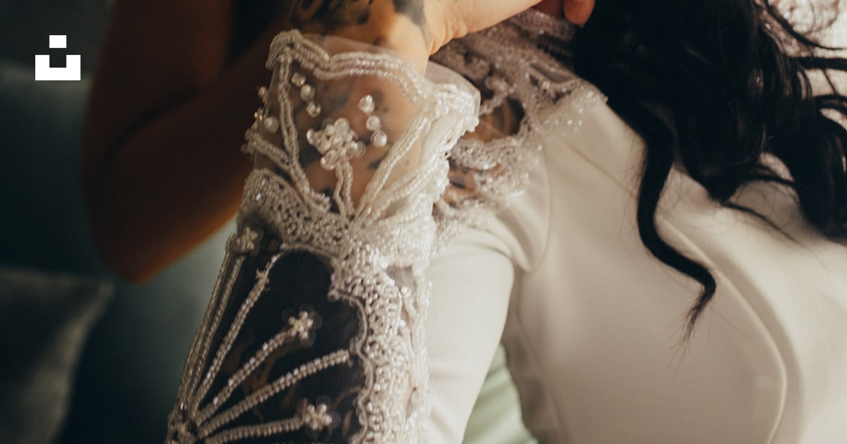 A Woman With A Tattoo On Her Arm Photo Free Skin Image On Unsplash