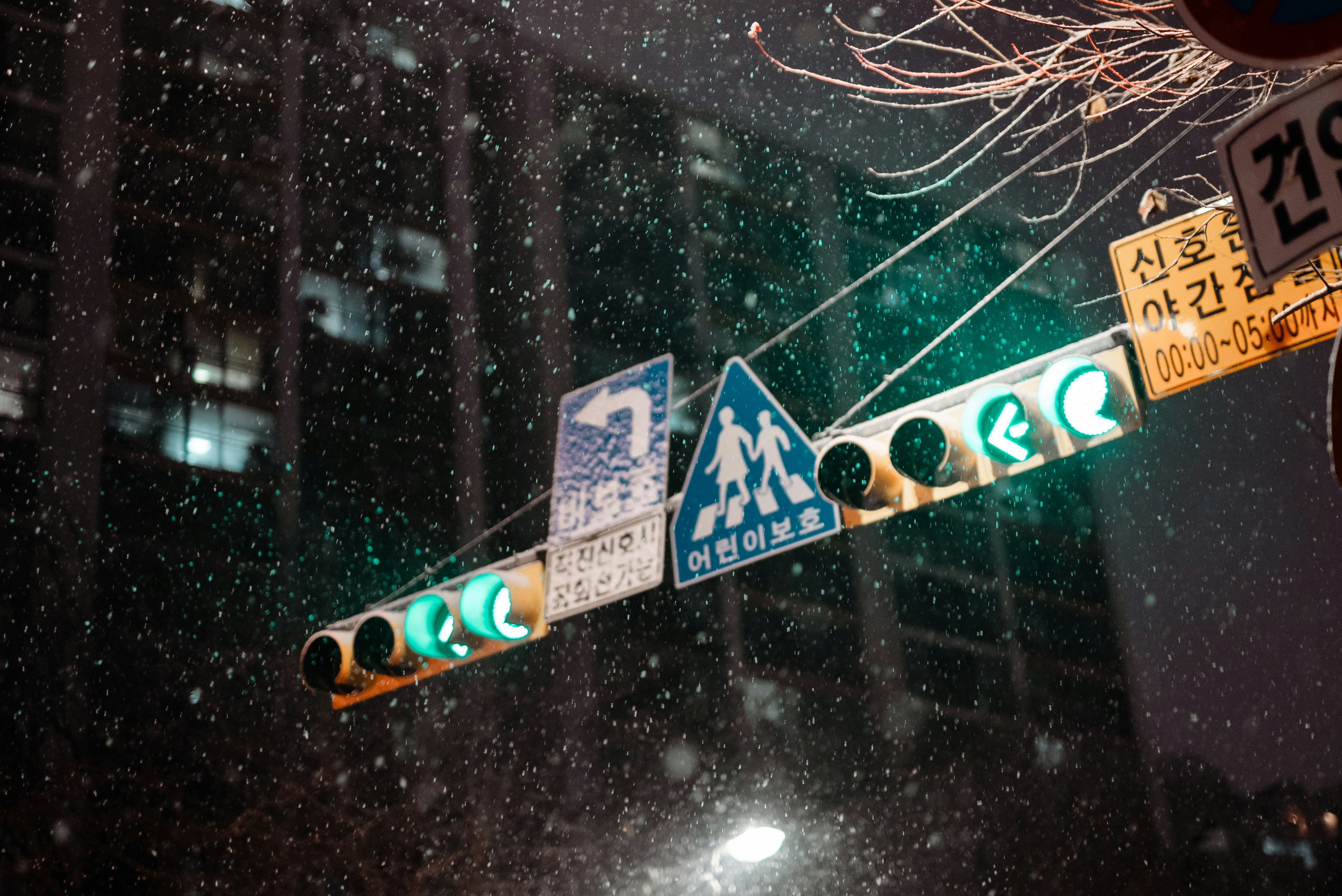 A traffic light with street signs on it photo – Free Uijeongbu Image on ...