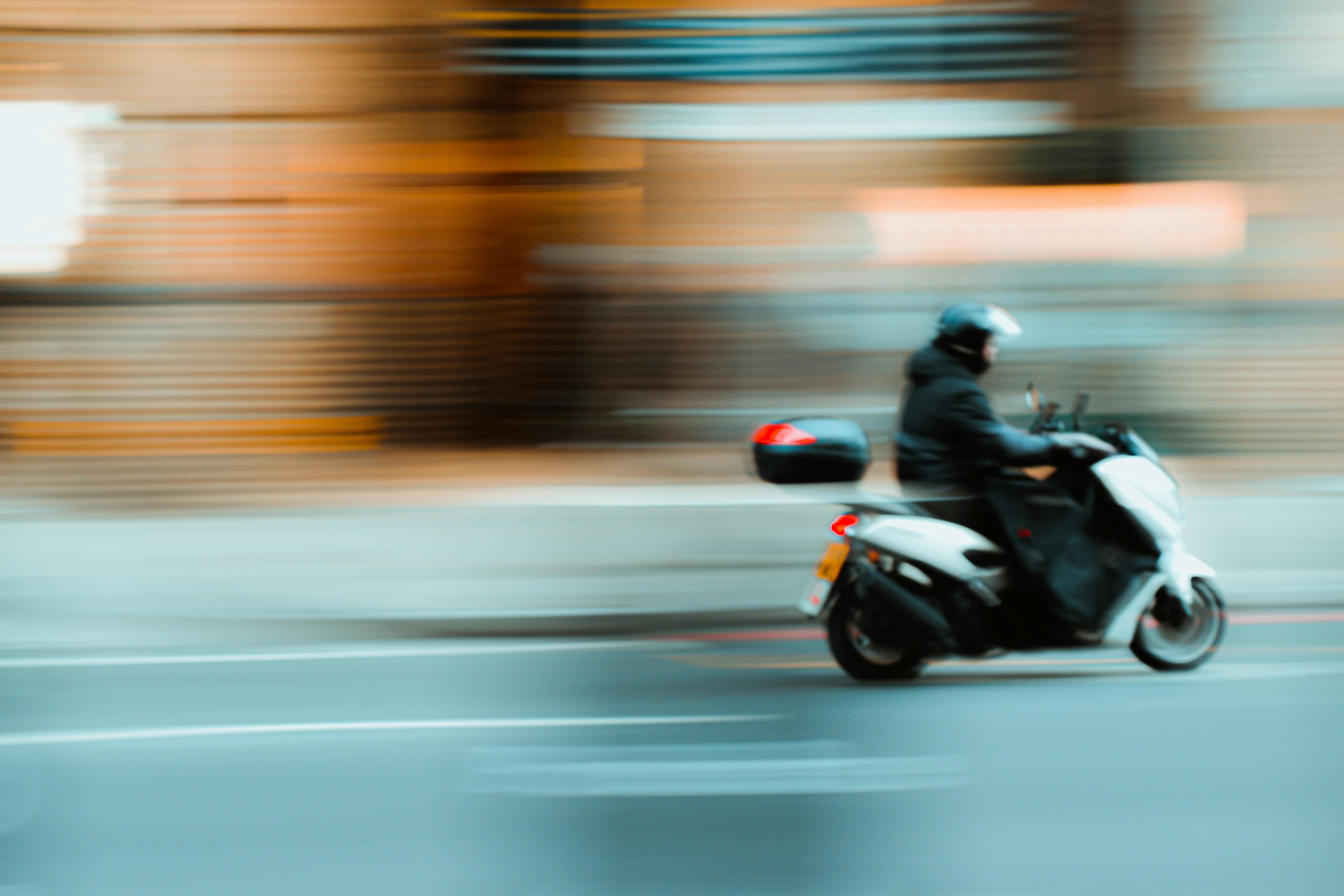 A blurry photo of a person riding a motorcycle photo – Free London ...