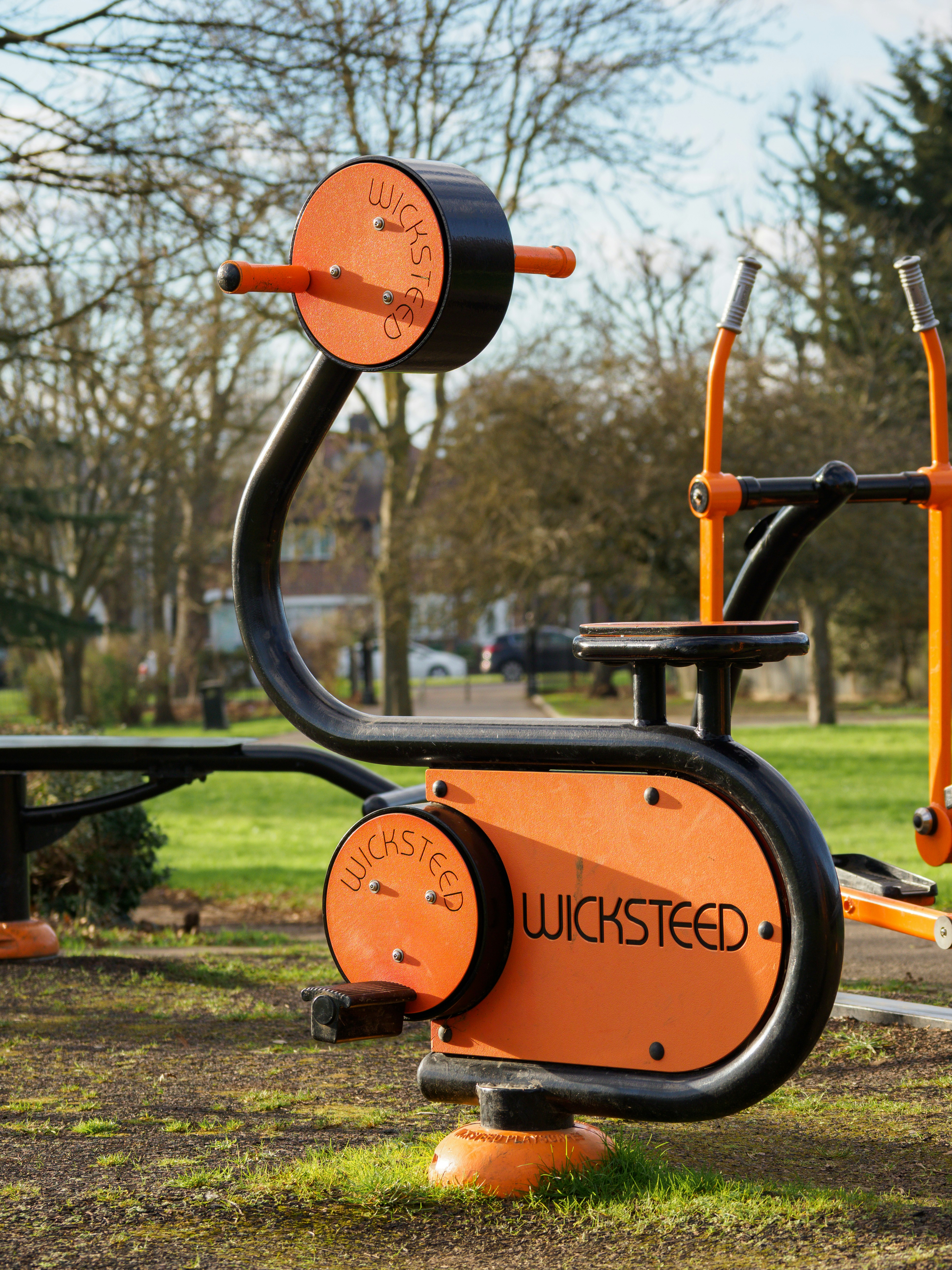 park, recreation area, exercise equipment, outdoor exercise, exercise apparatus, orange, outdoors, park, bokeh, blurred background, exercise, active, keep active, outdoors, 