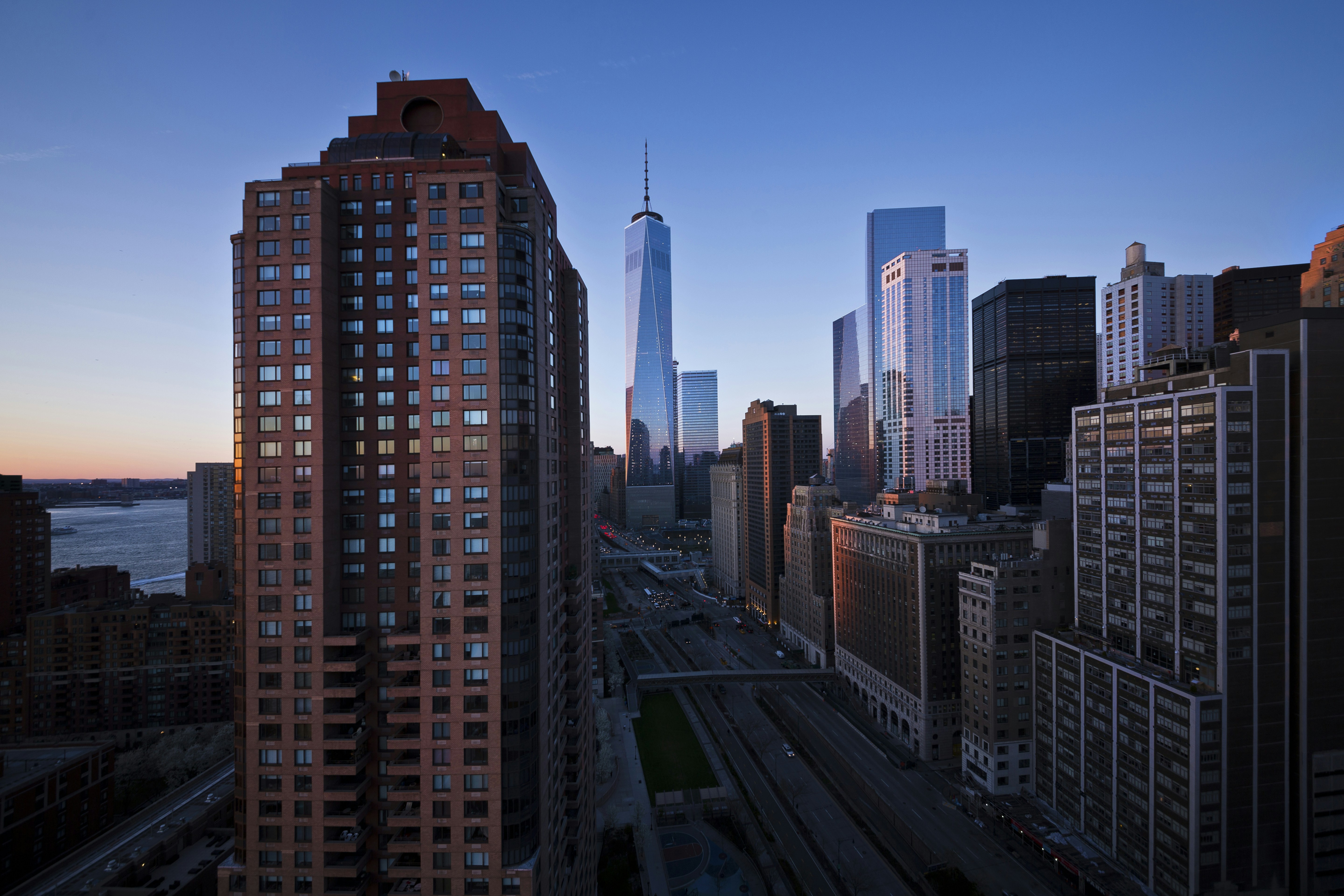 a view of a city with tall buildings
