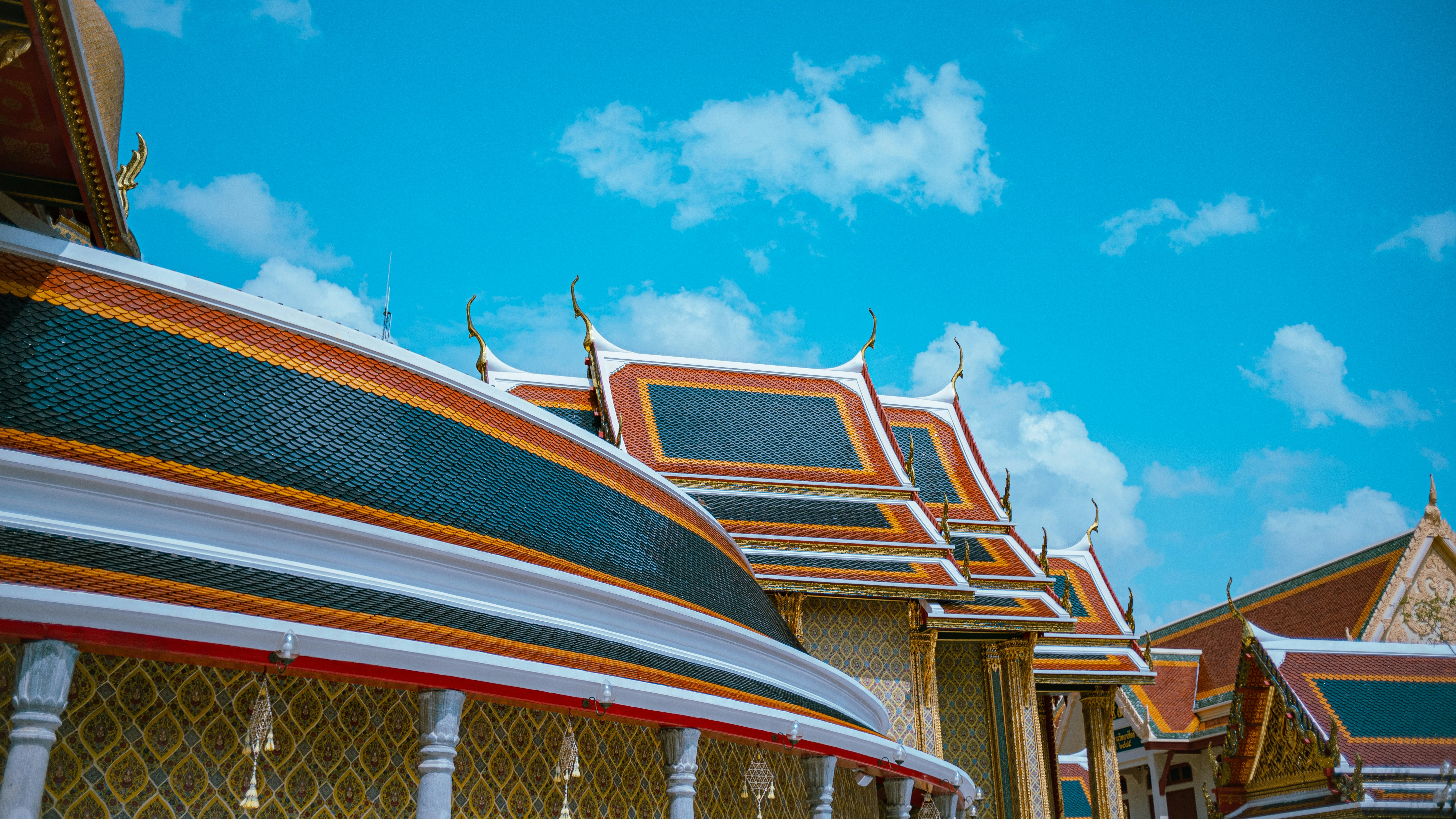 a row of buildings with a sky in the background