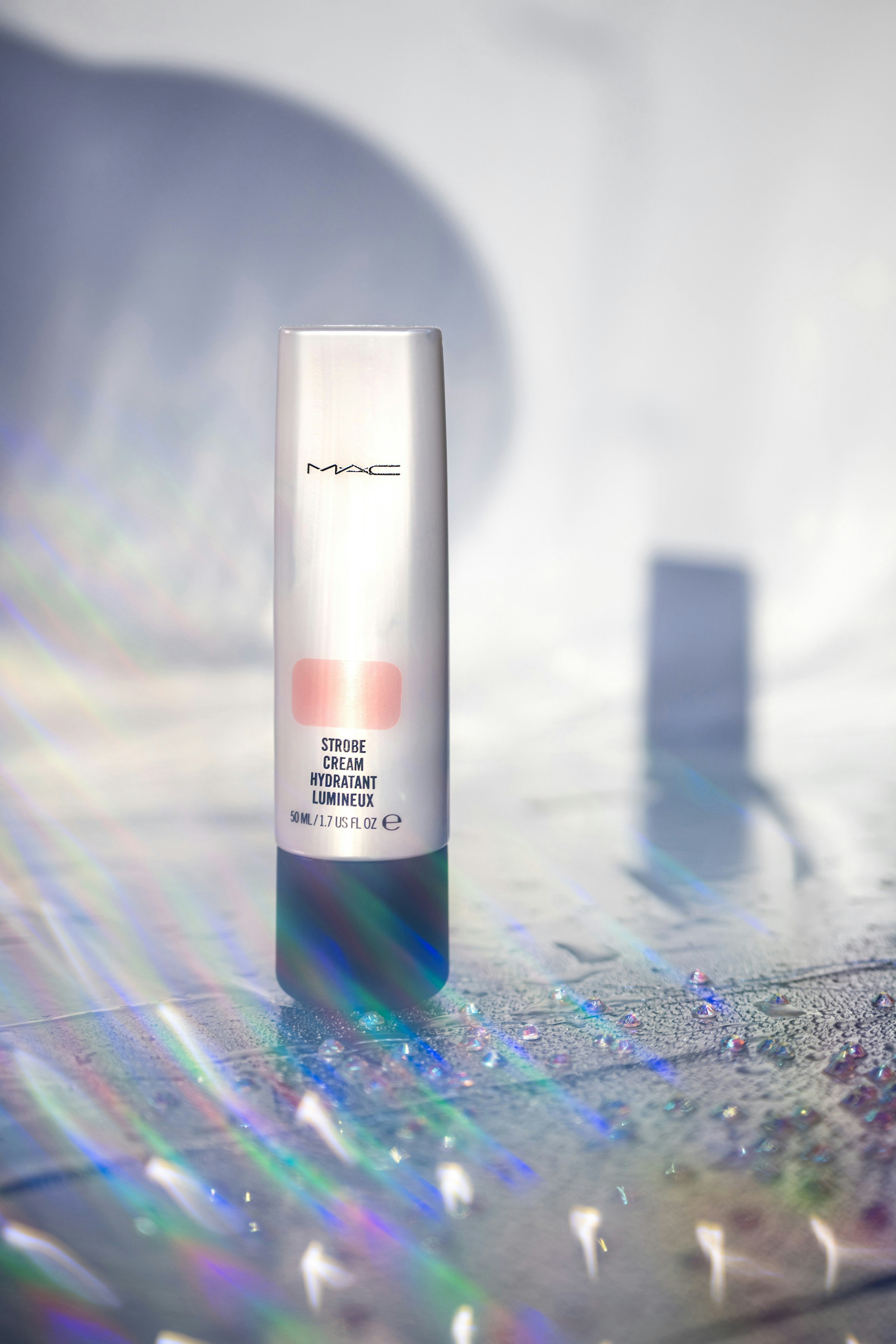 A bottle of mac cosmetics sitting on a table photo – Free New york ...