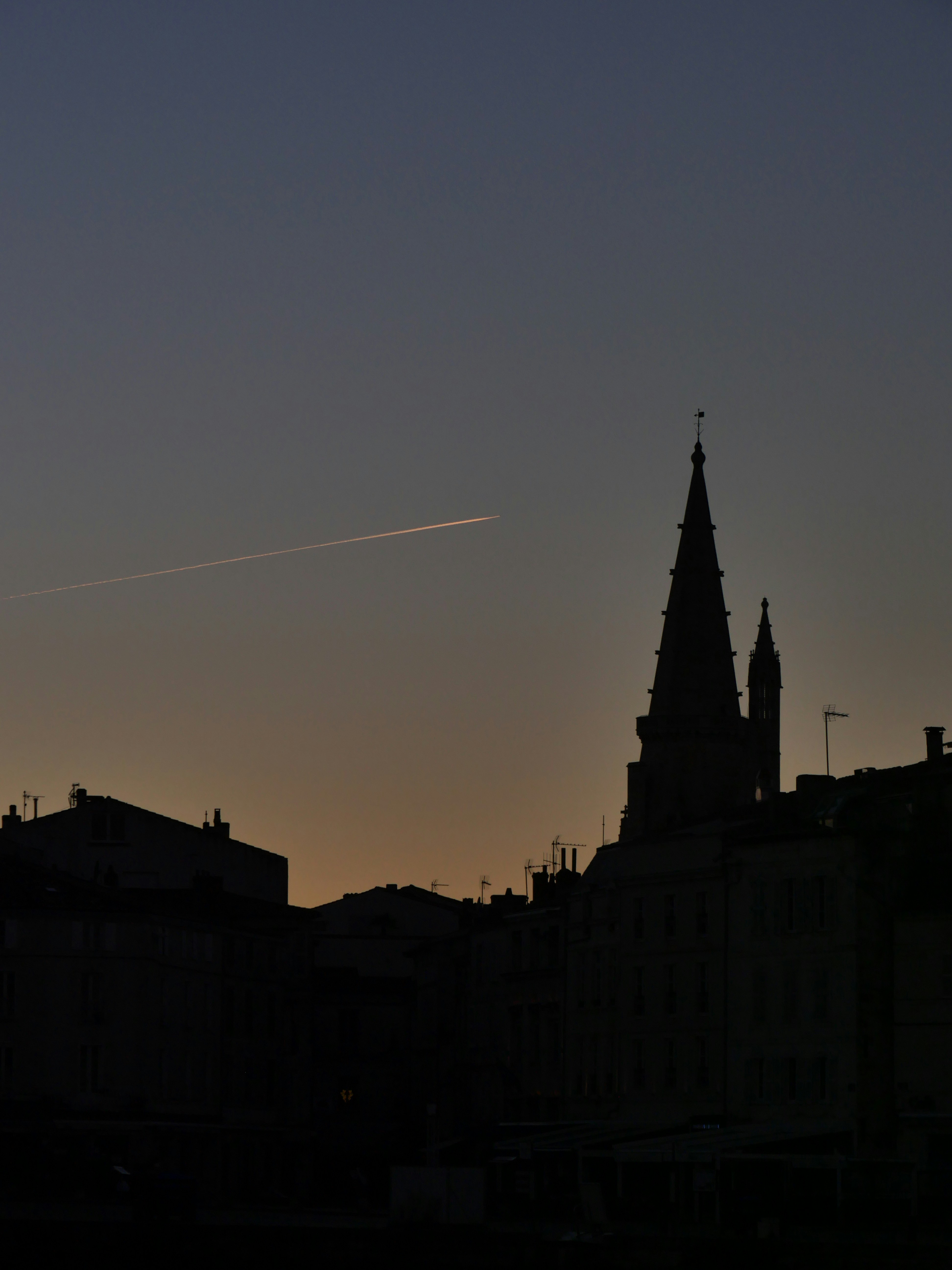 Twilight Spires Over a Quiet Riverfront