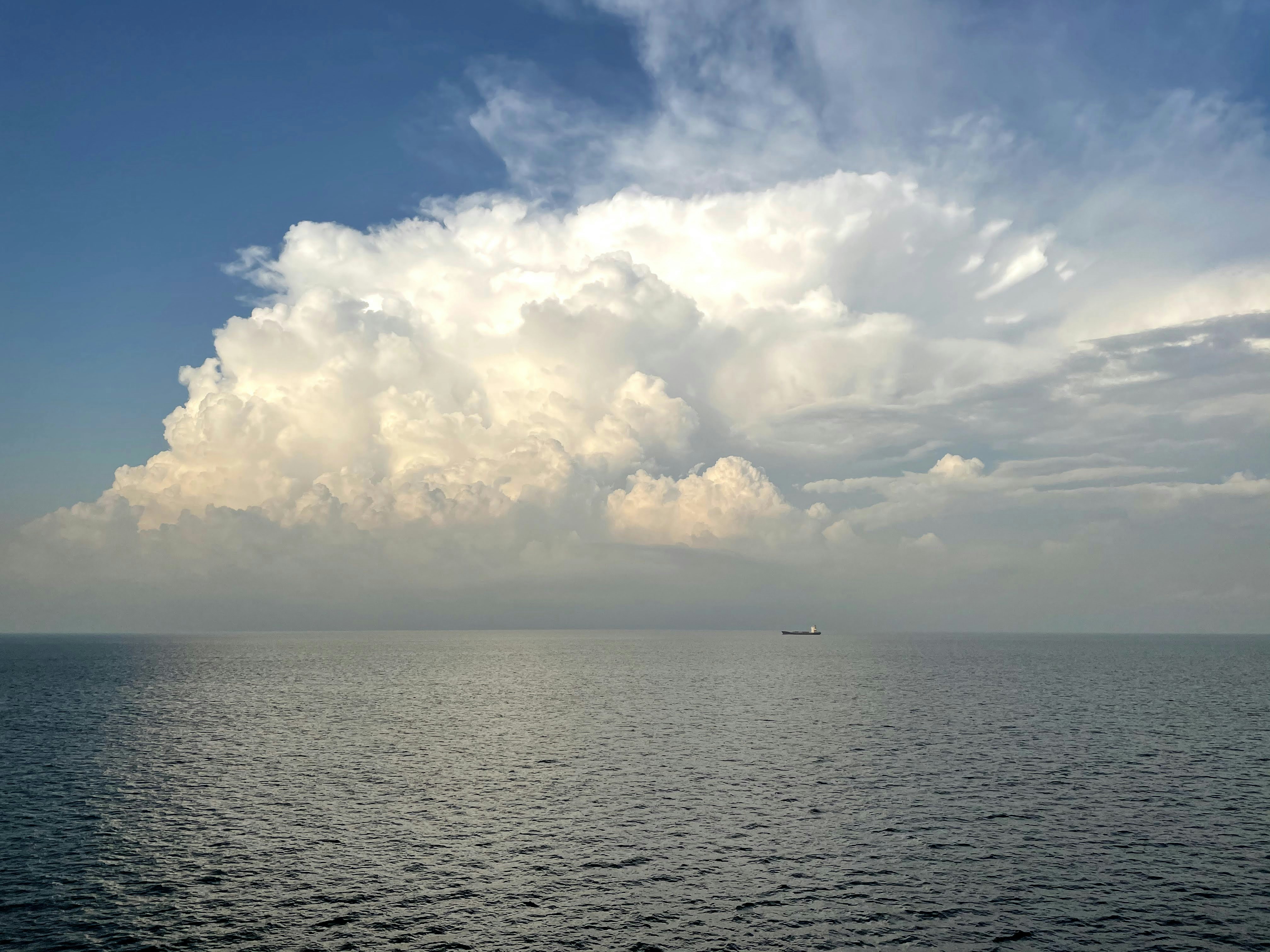 Cumulus Cathedral Over a Quiet Sea