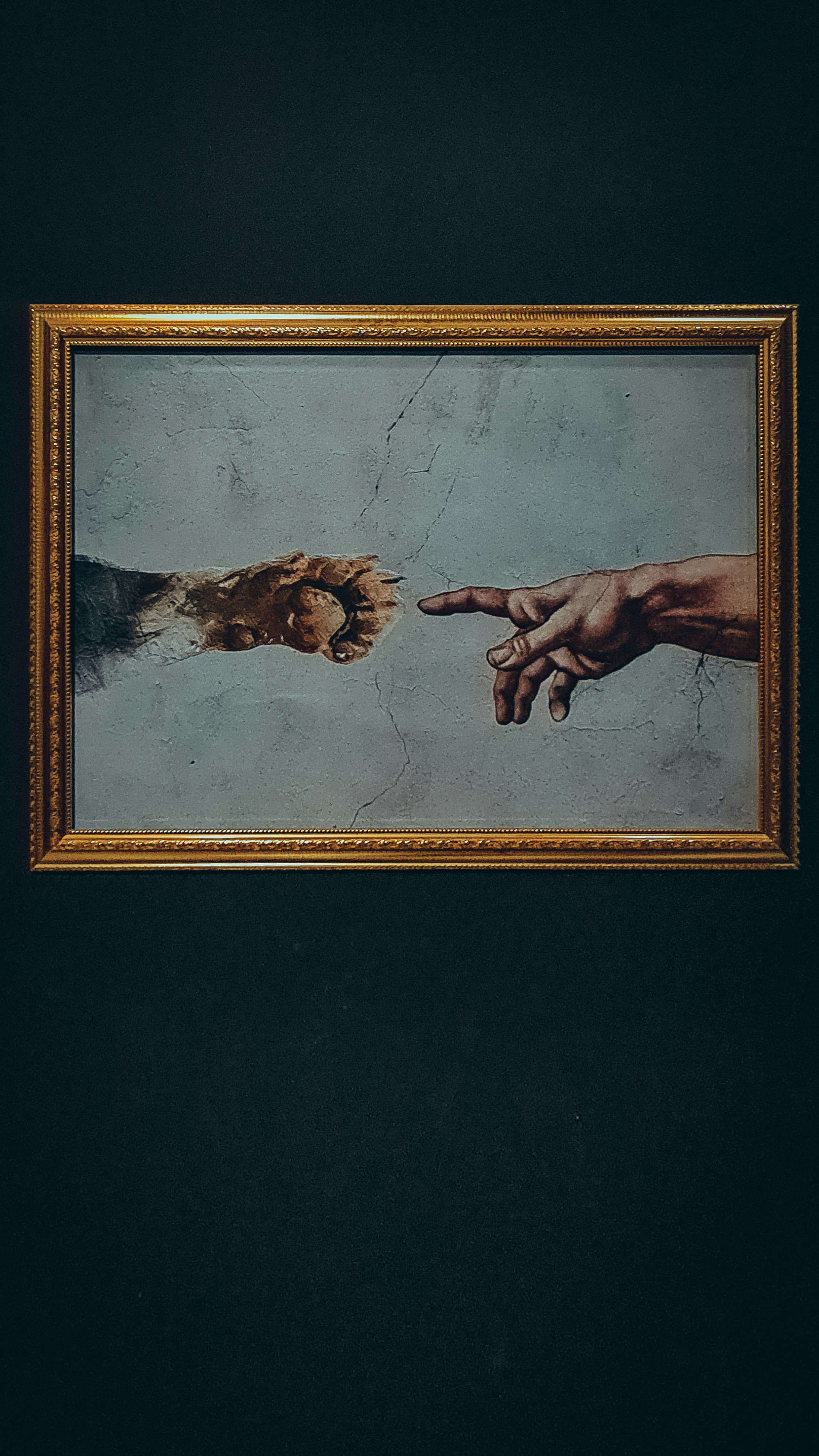 Between Frame and Wall: A Framed Reproduction Evoking The Creation's Reach